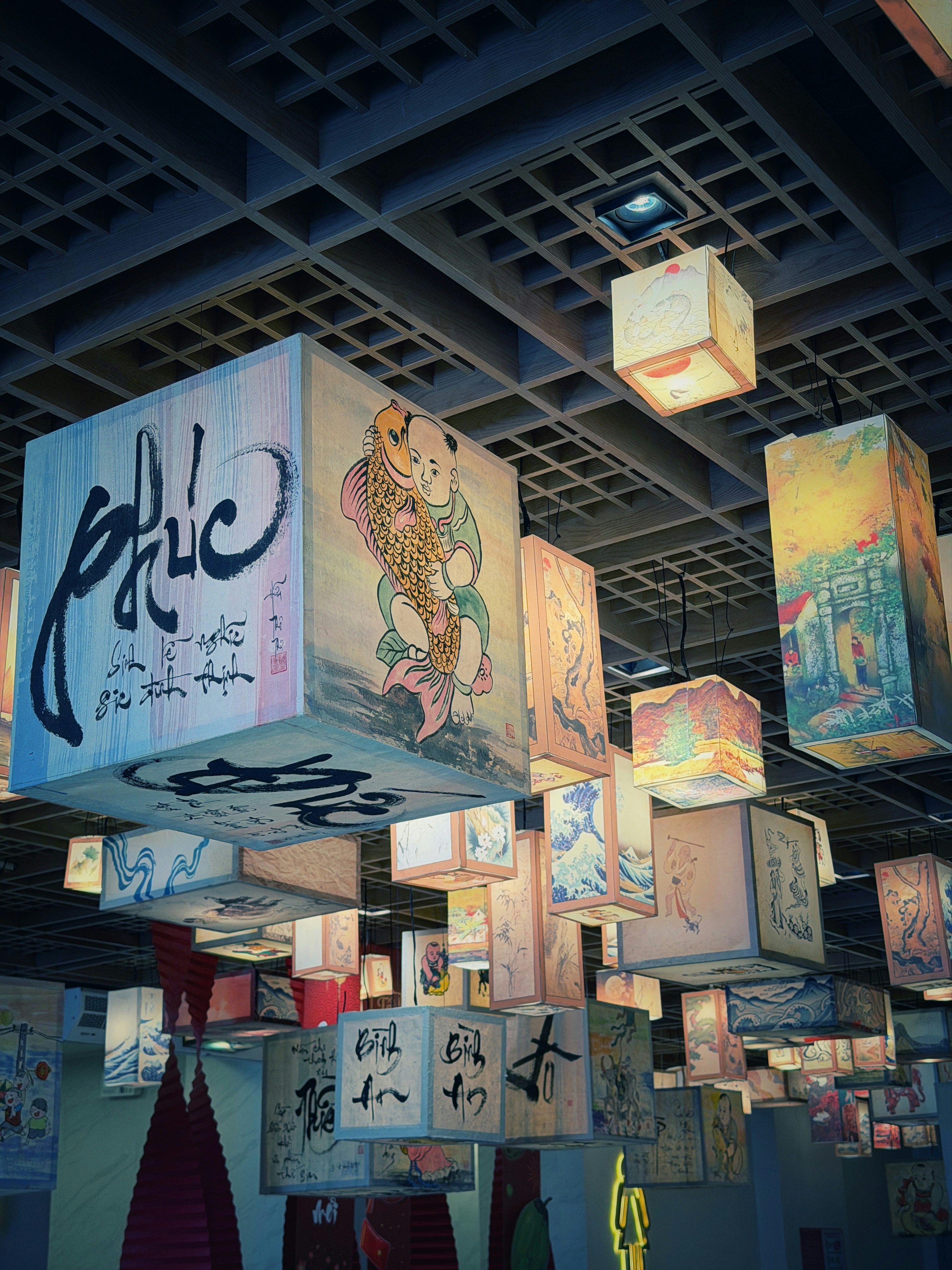 Floating Lantern Gallery: Painted Cubes in a Ceiling Forest