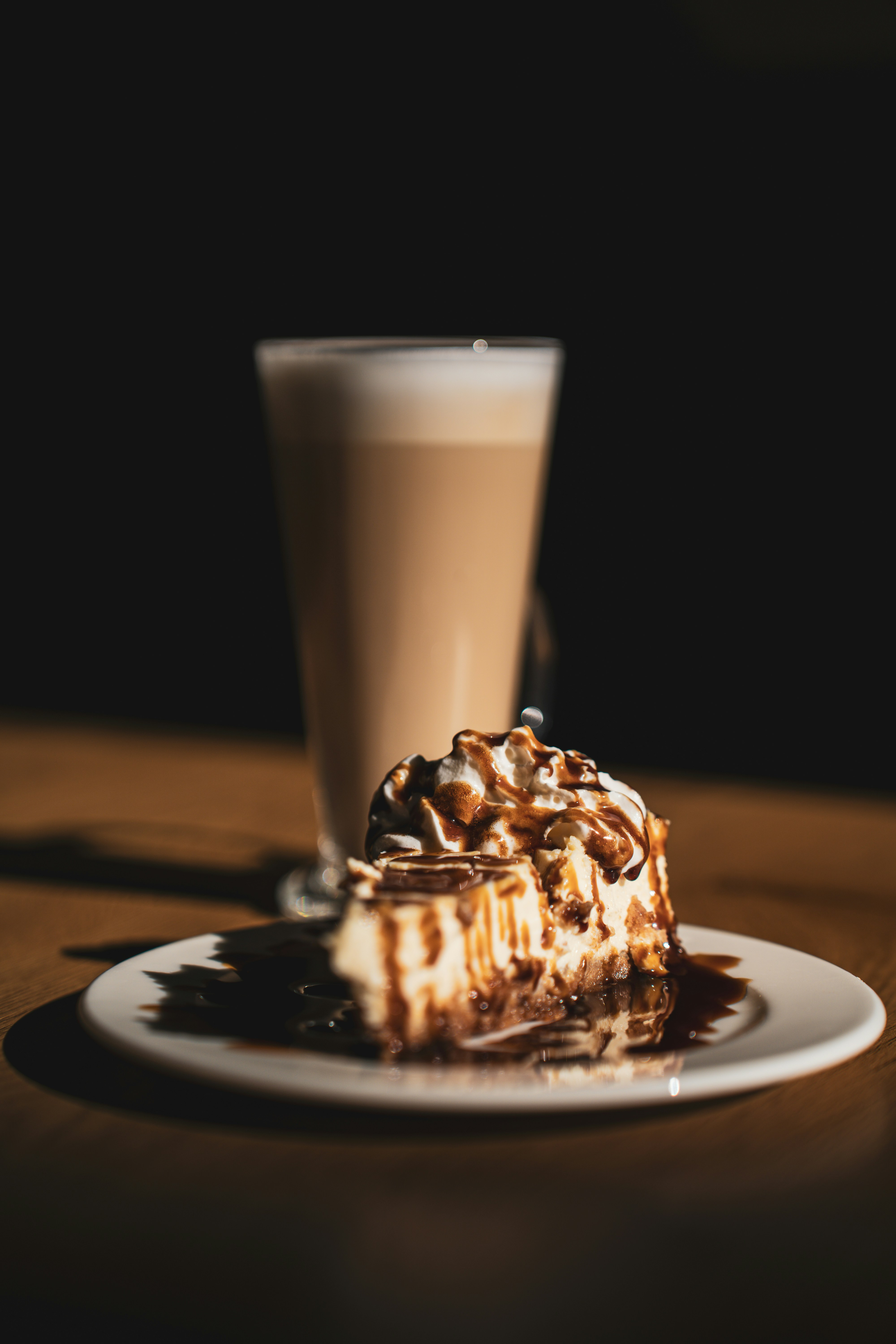 Caramel Crema Bliss: A Slice of Dessert and Dark Coffee