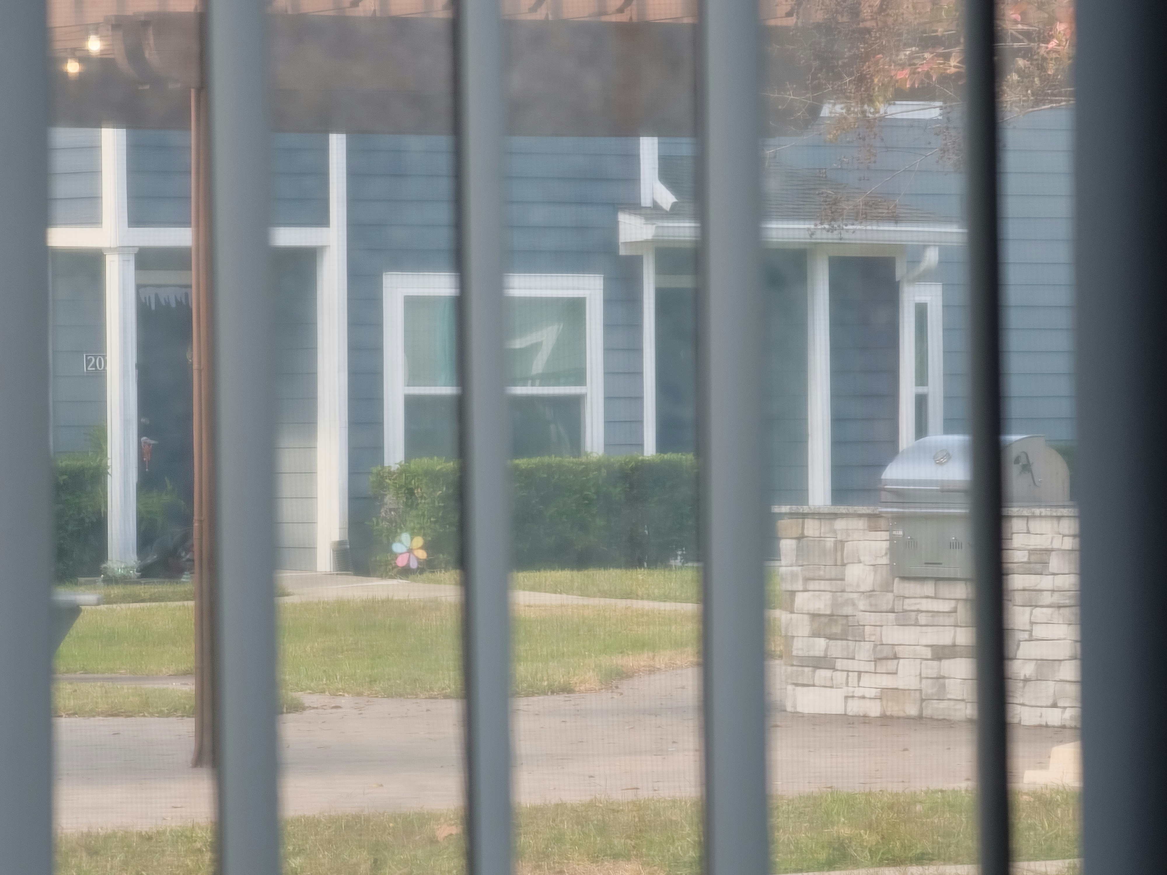 Hidden Front Yard Through Vertical Slats