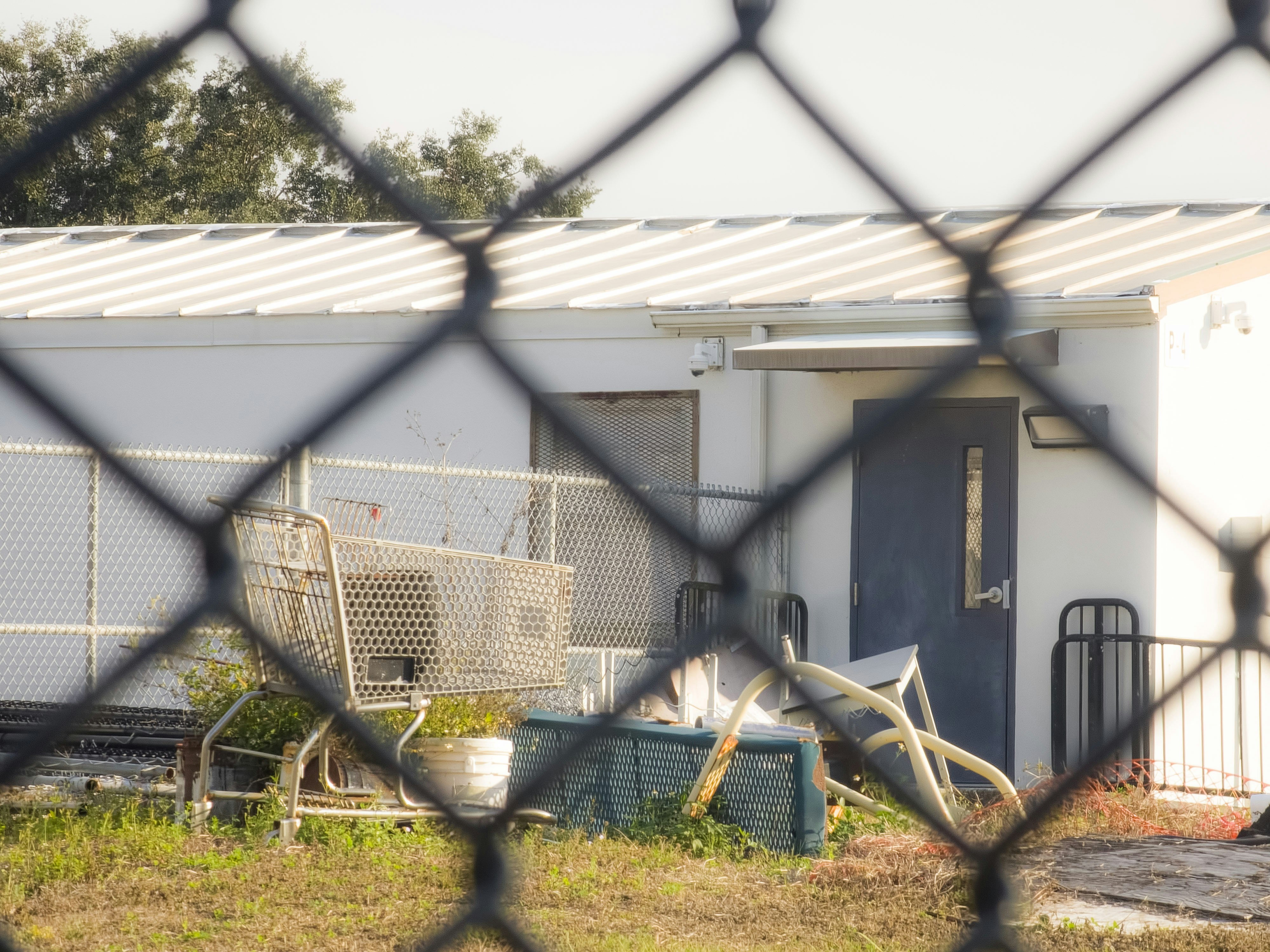 Chain-link Quiet: A Ranch Backstage Hidden Behind the Fence