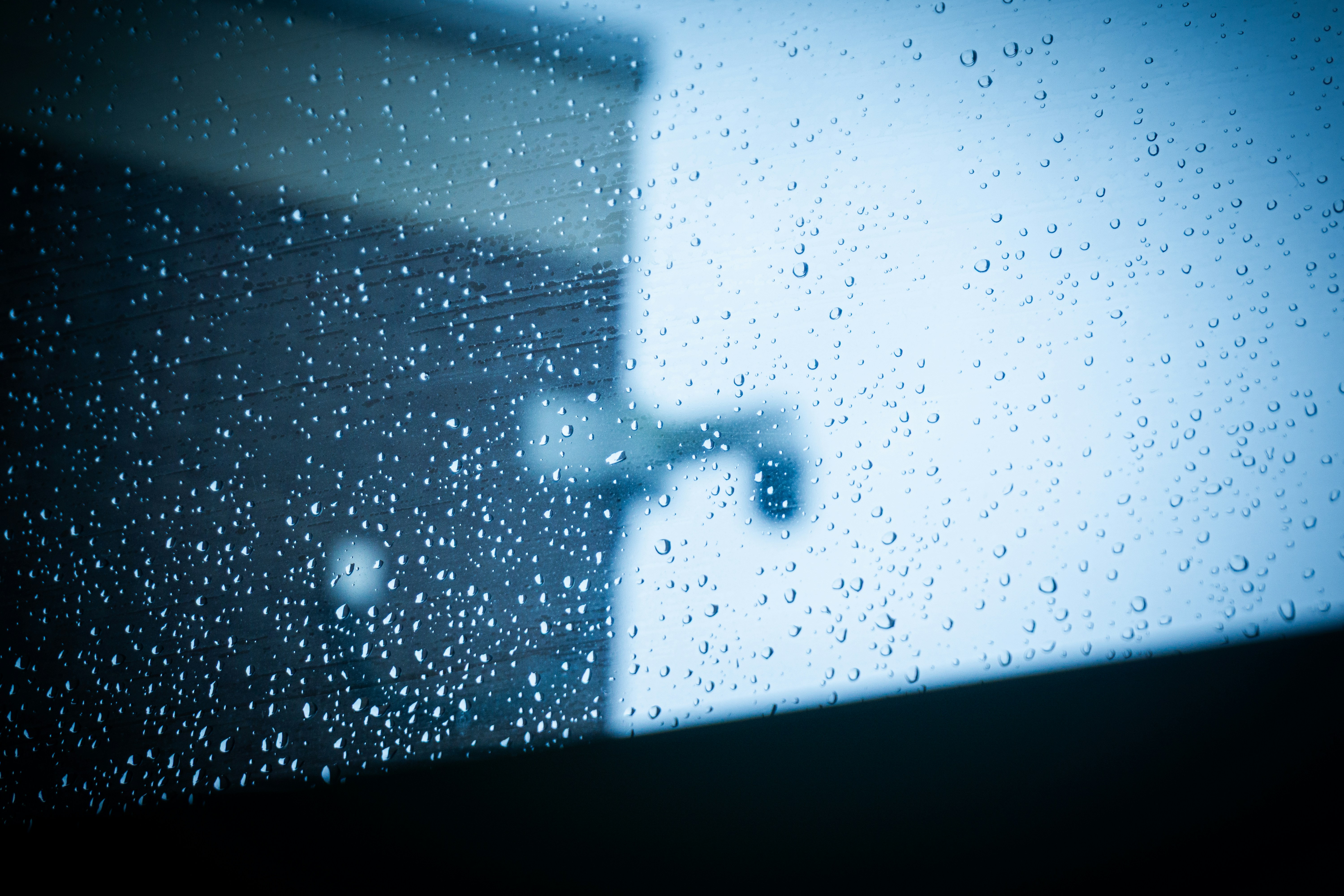 Droplets on Glass: A Quiet Window into Rainy Light