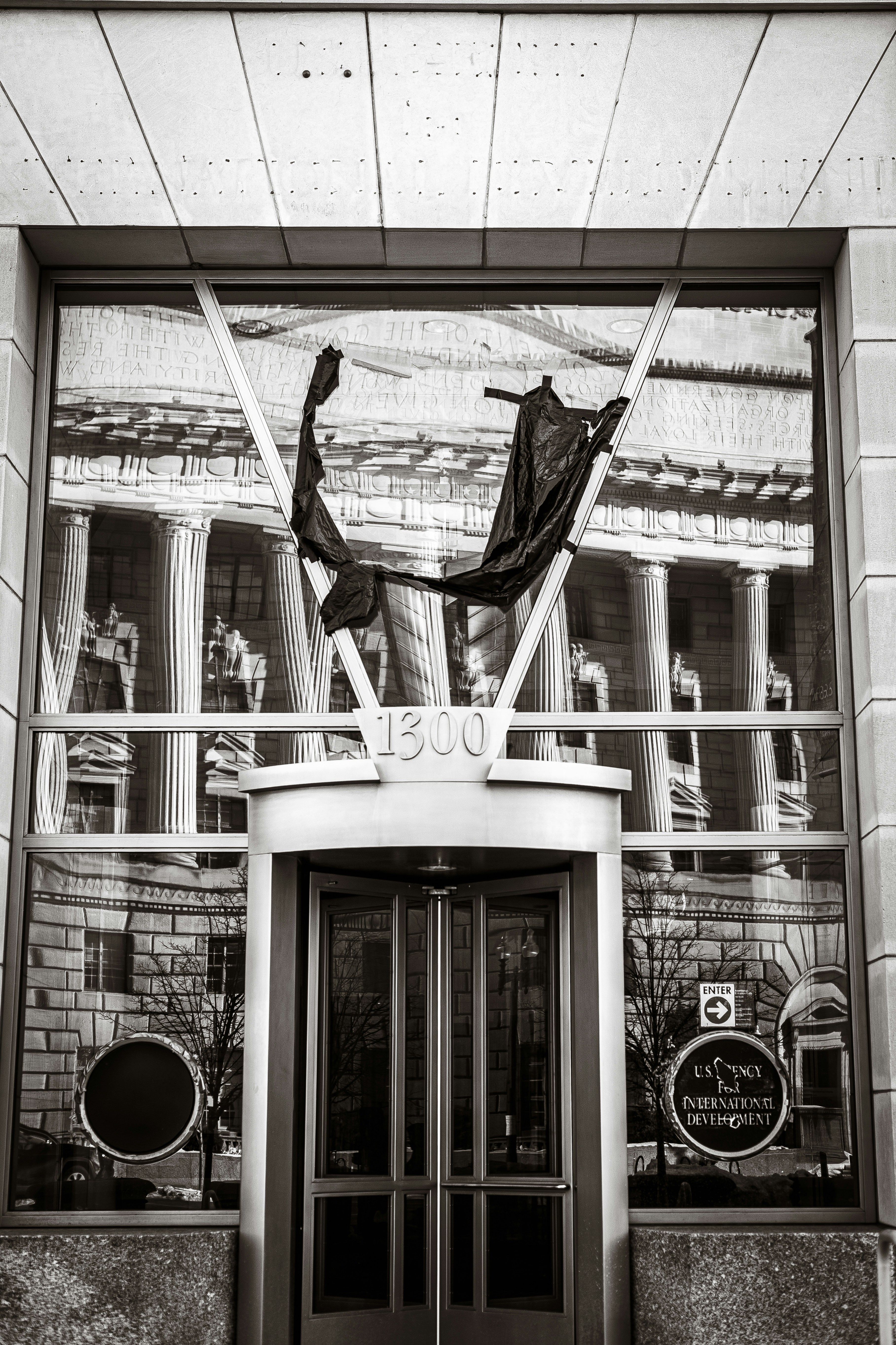 Sculpted Mystery Above the Entryway