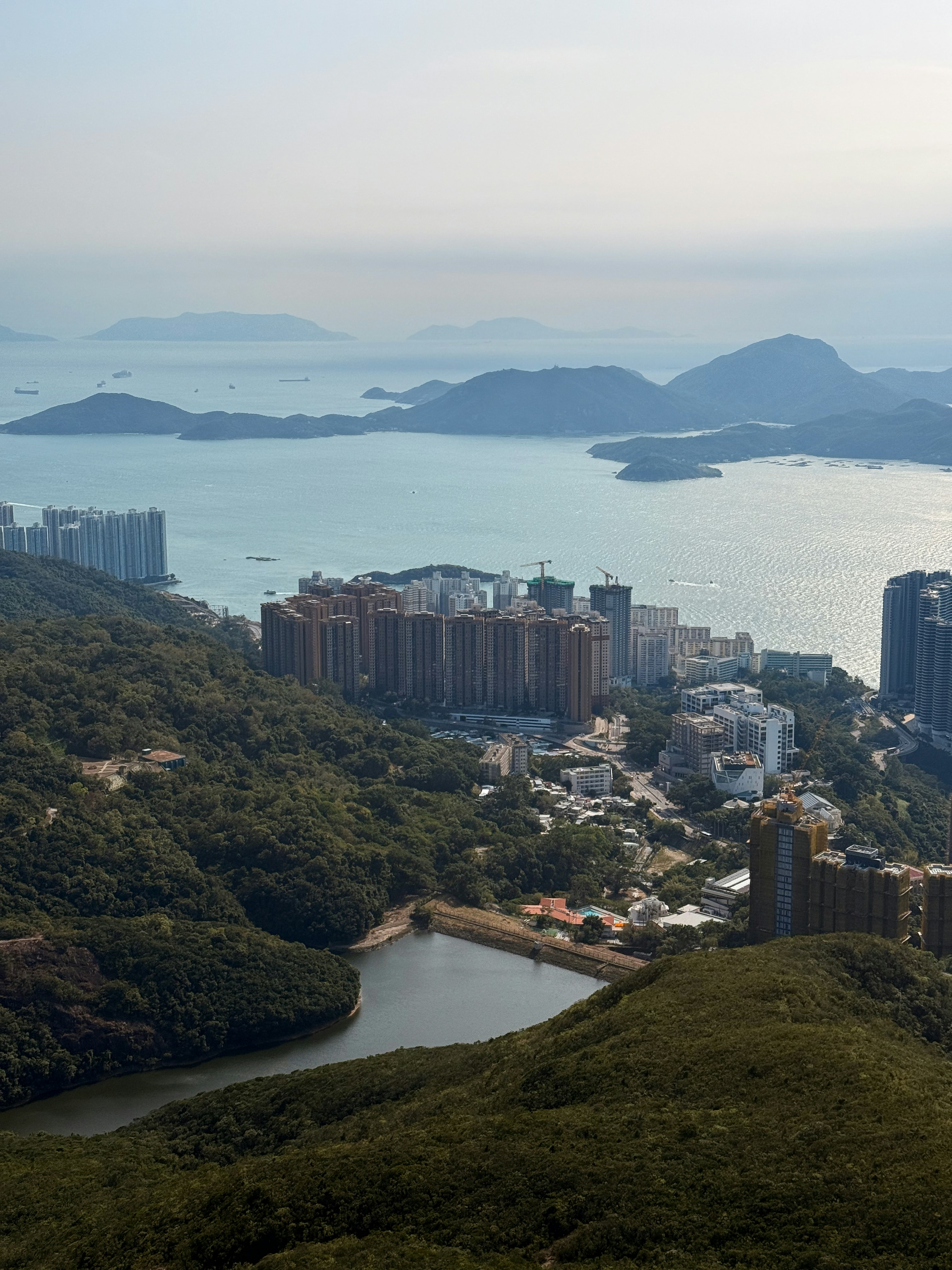 Coastal Horizon: Urban Ribbon Adorned by Hills and Sea