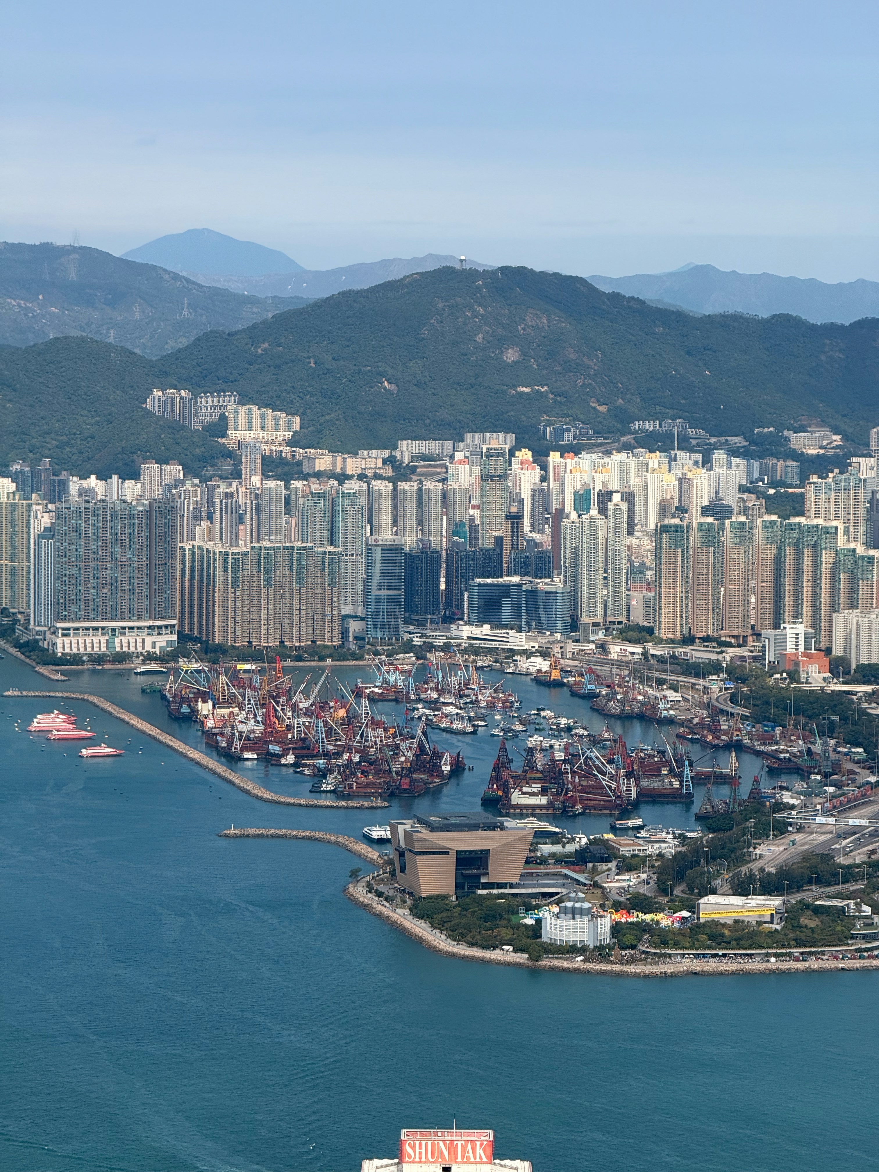 Harbor Cityscape: Concrete Crowned by Coastal Hills