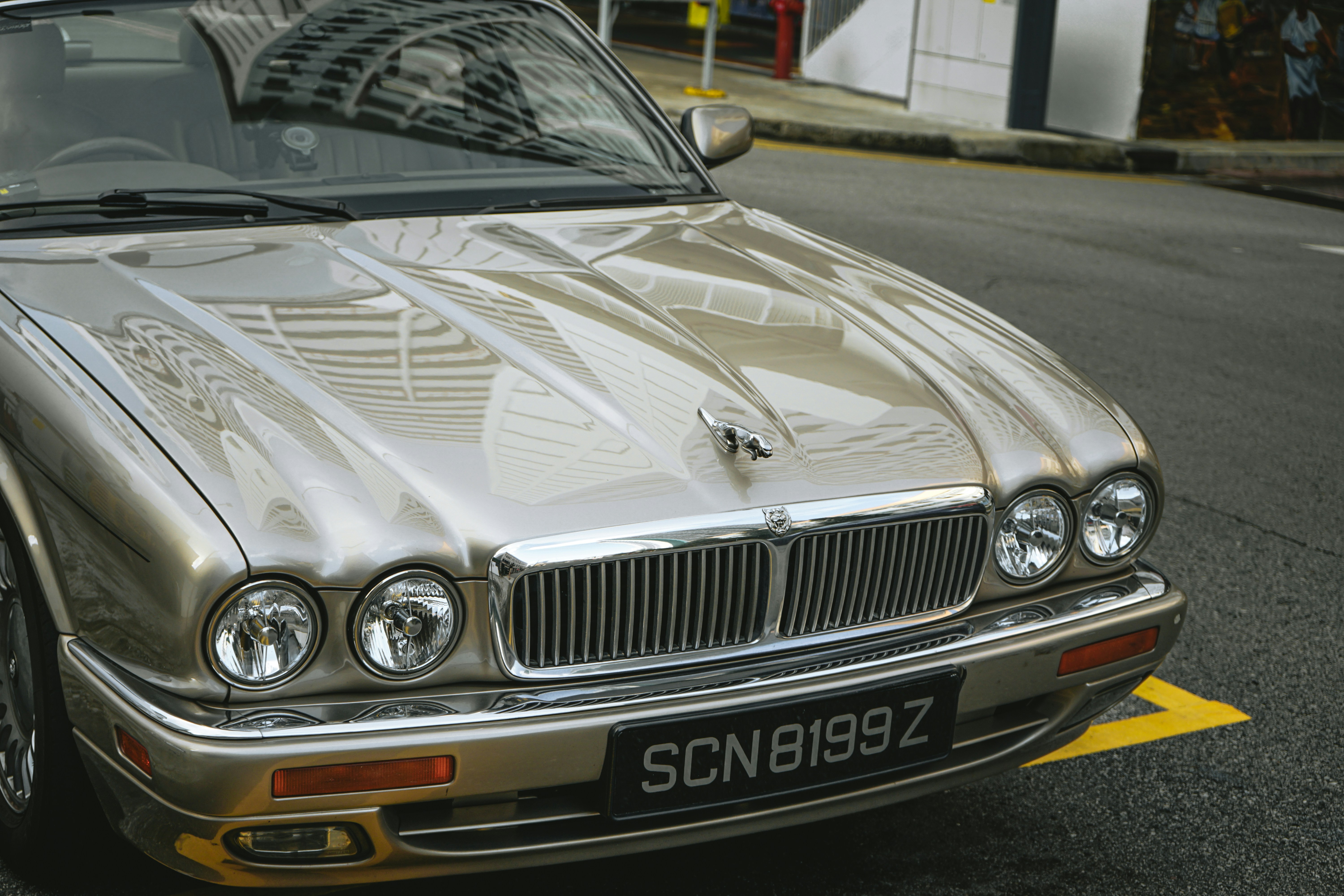 Chrome Classic: Front View of a Vintage Jaguar Sedan