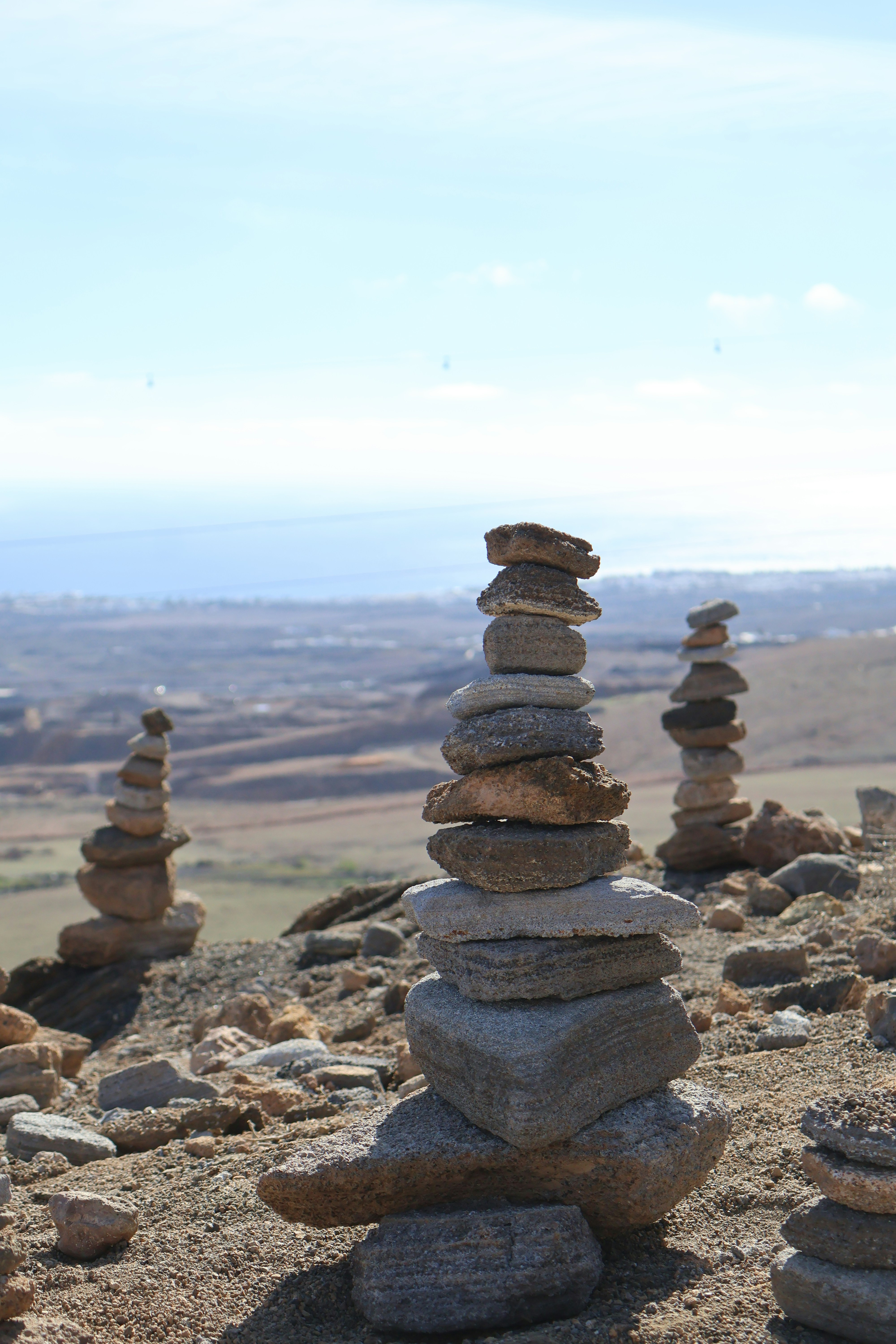 Stone Stack Summit: Quiet Monoliths against a Distant Valley