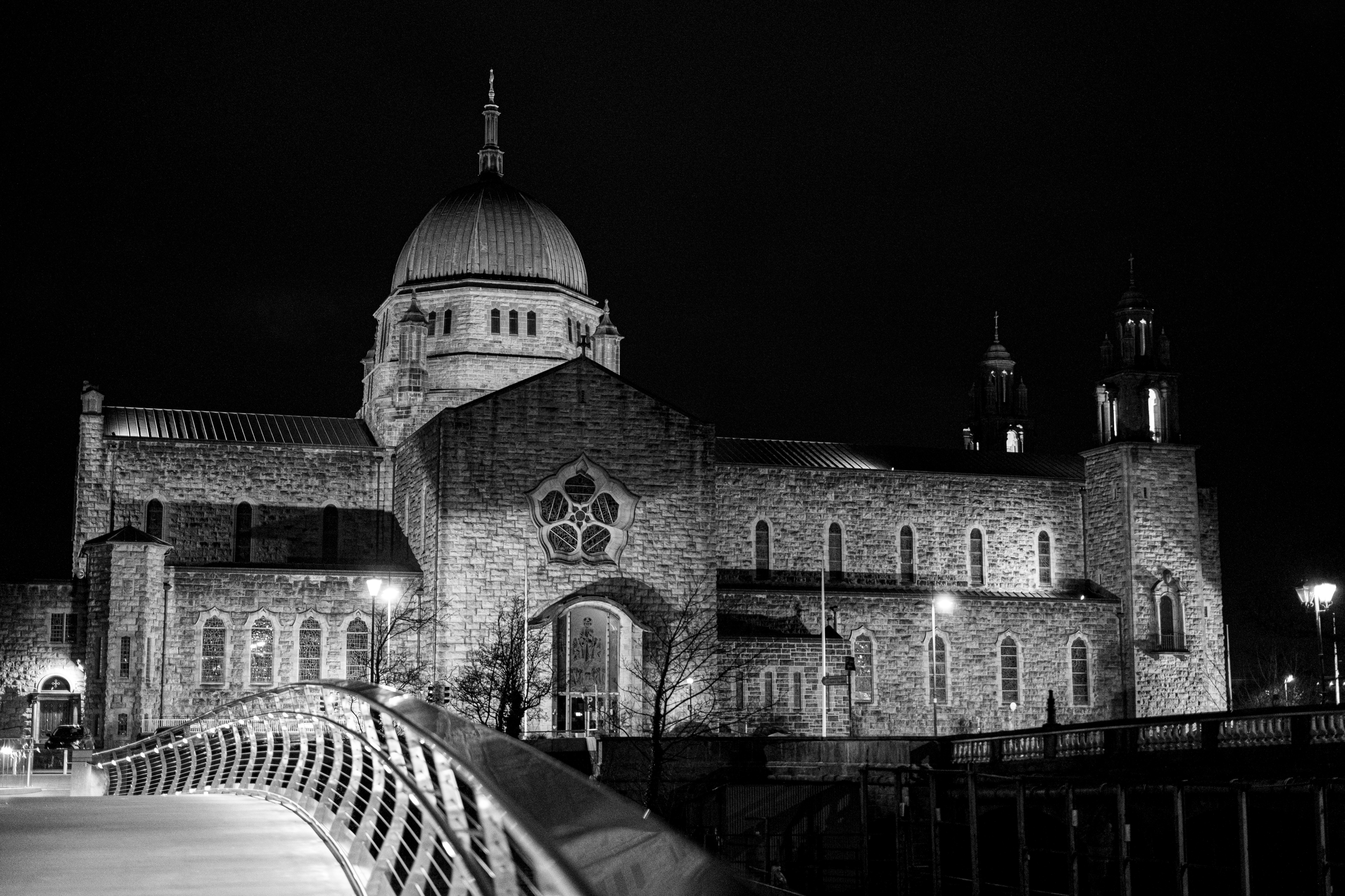 Moonlit Cathedral: Nightfall Over the Bridge