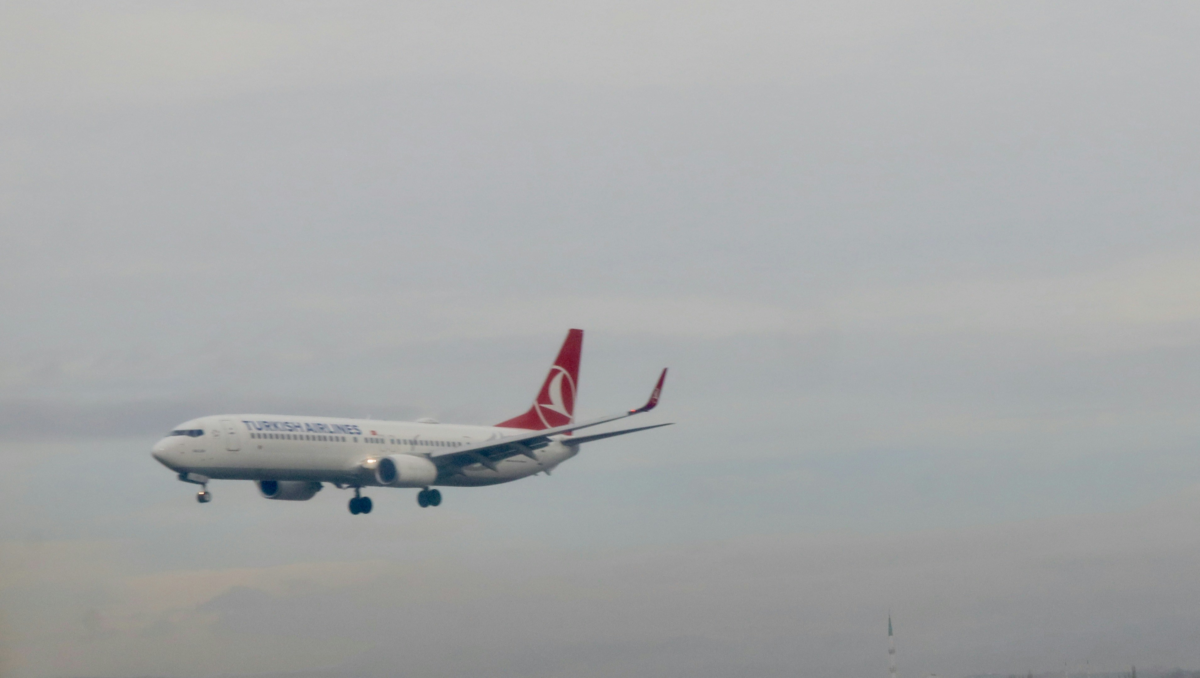  Landing Runway of a Turkish Airlines Jet on a Misty Horizon