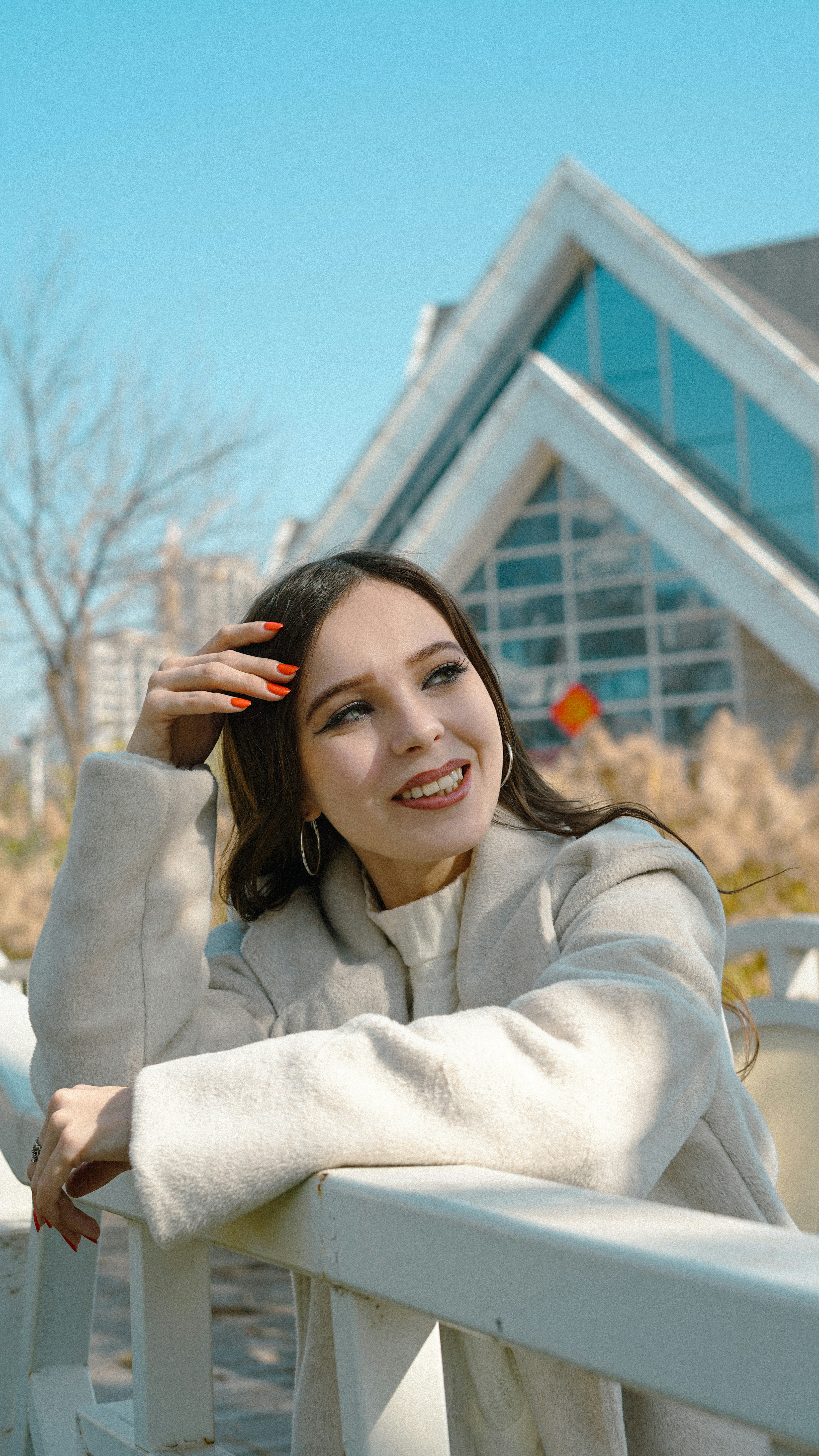 Portrait on the Bridge: Soft sunlight, bold nails