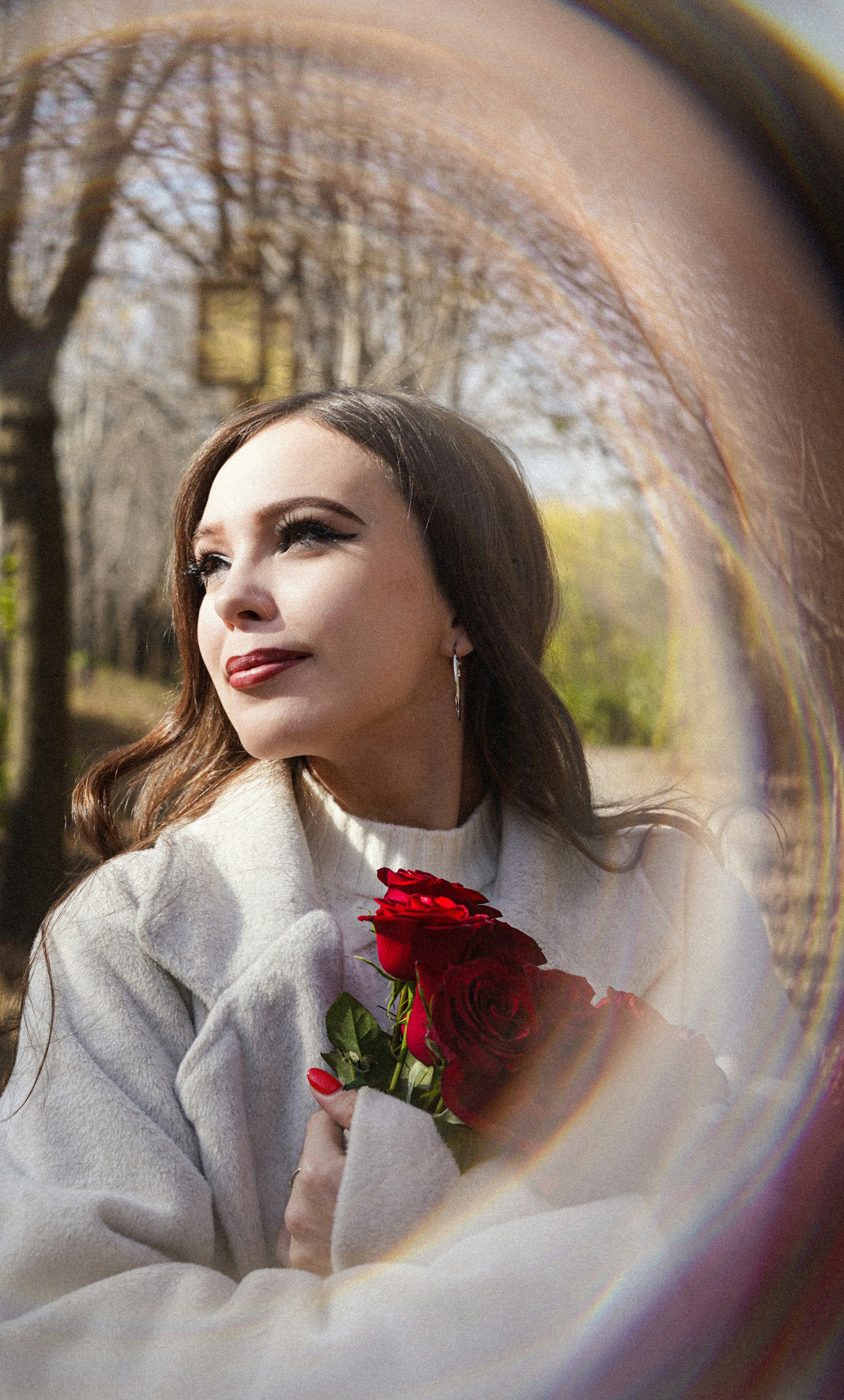 Bouquet of Light: A Portrait through a Rainbow Ring