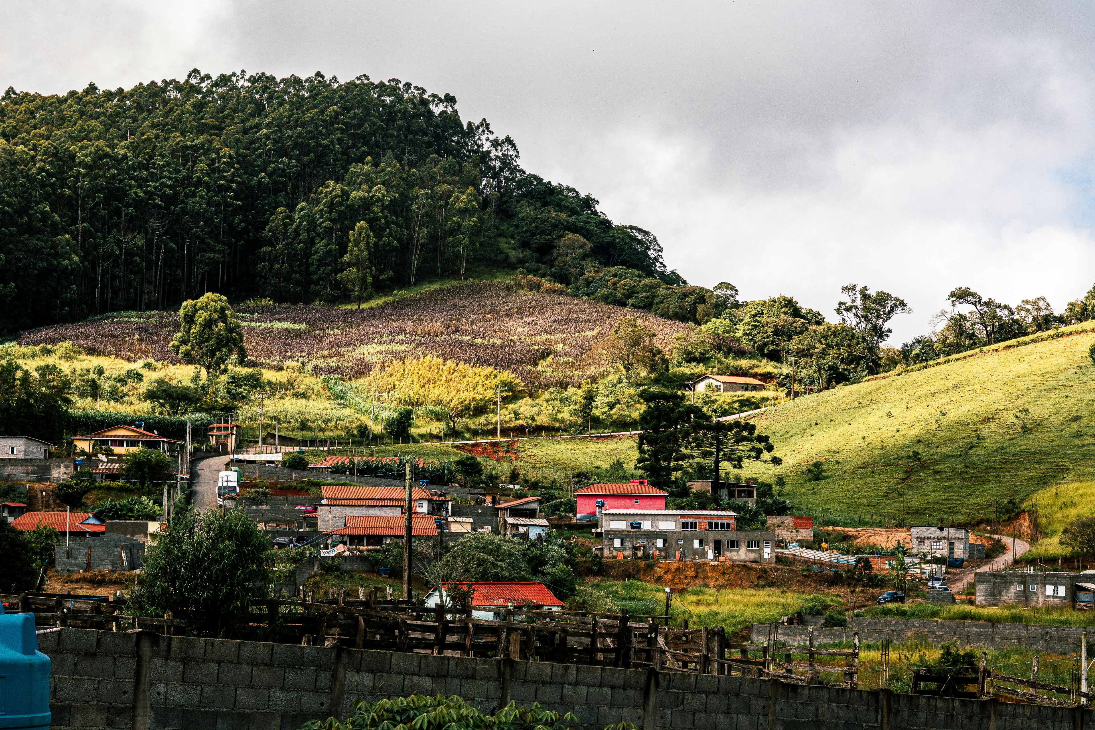 Hilltop village under a sweeping sky