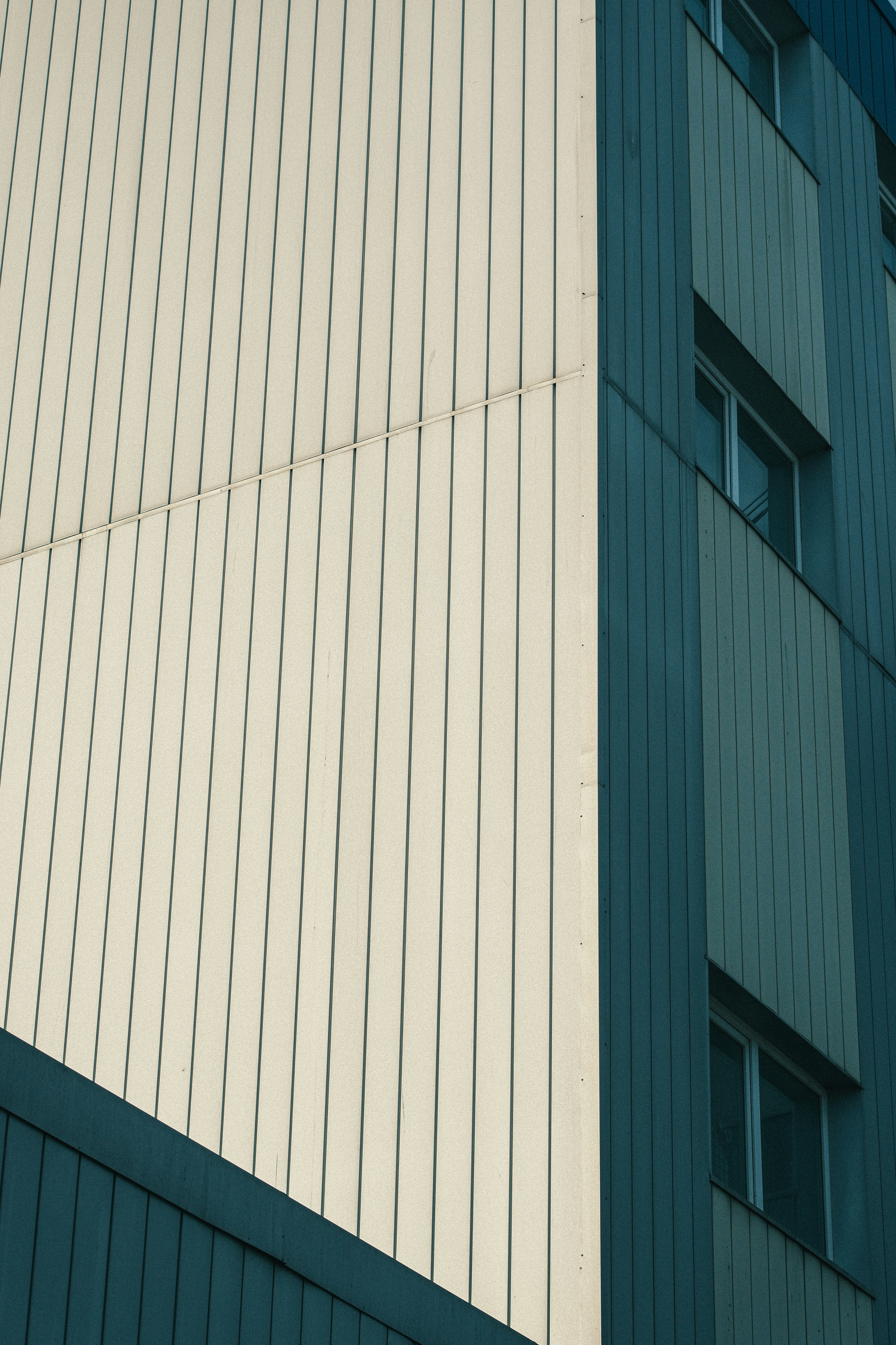 Converging Facades: Vertical Stripes Meet Shadowed Edges