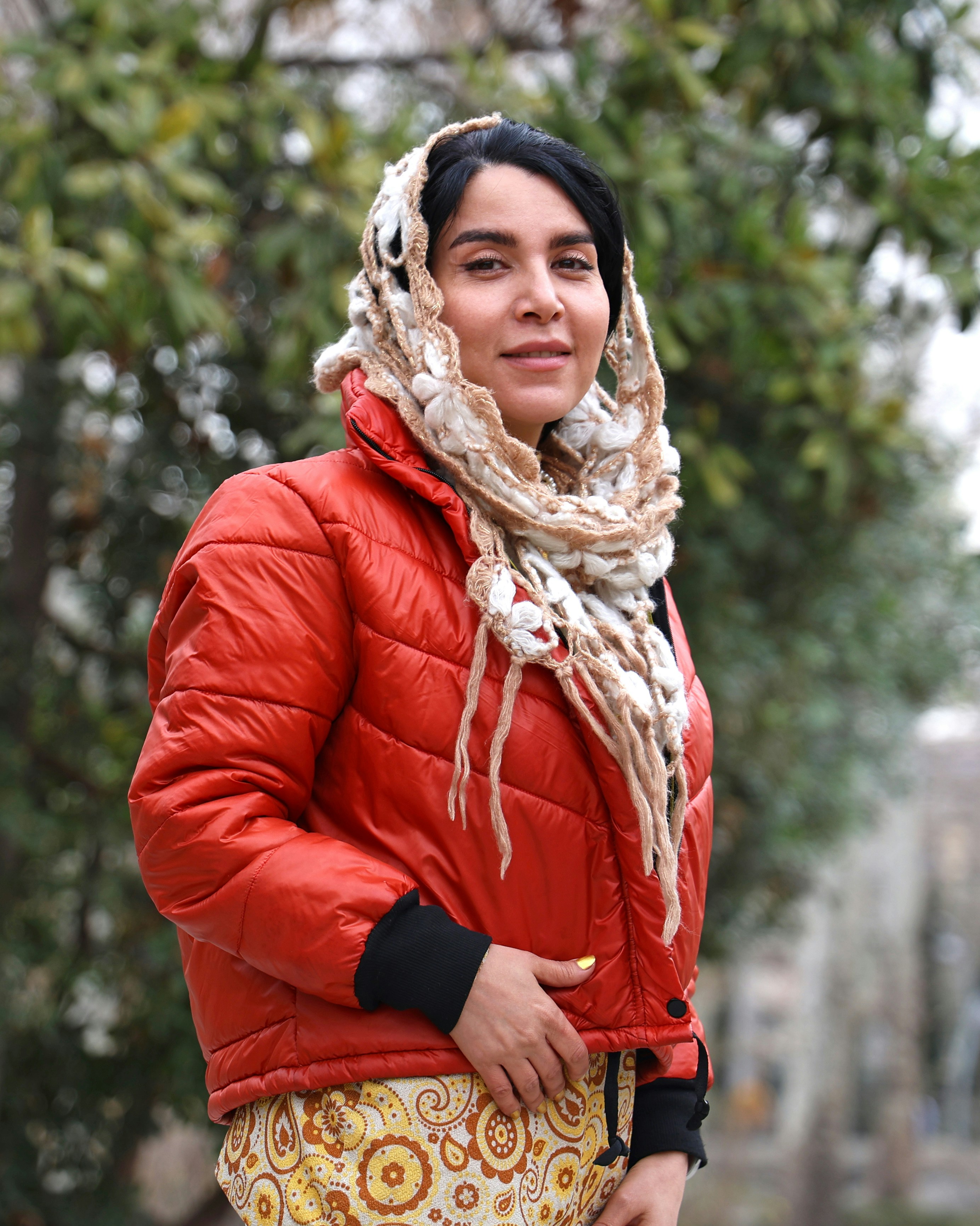 Crimson Winter Stance: A Portrait in Red and Cream