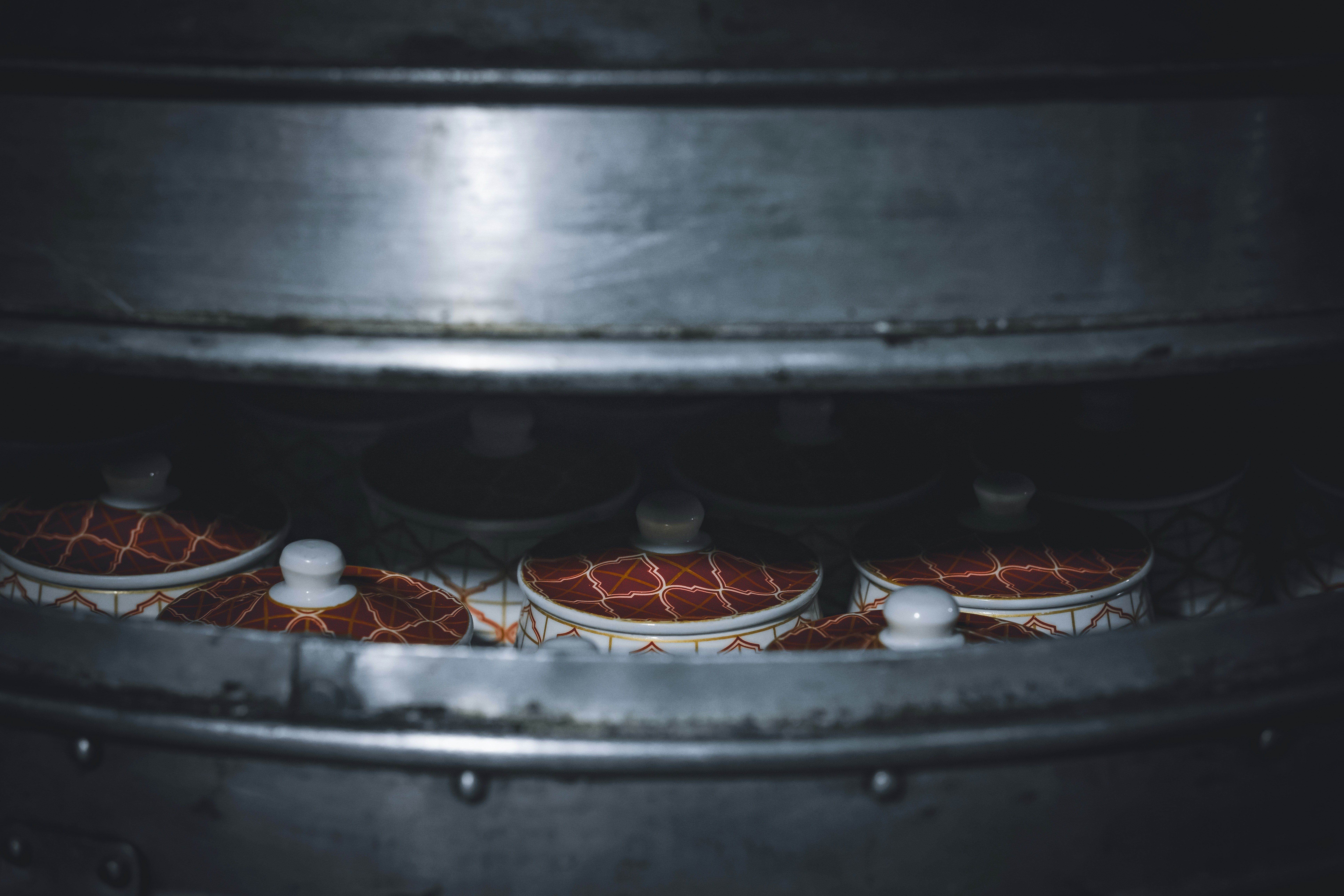 Iron-Curled Patties Behind a Steel Rim