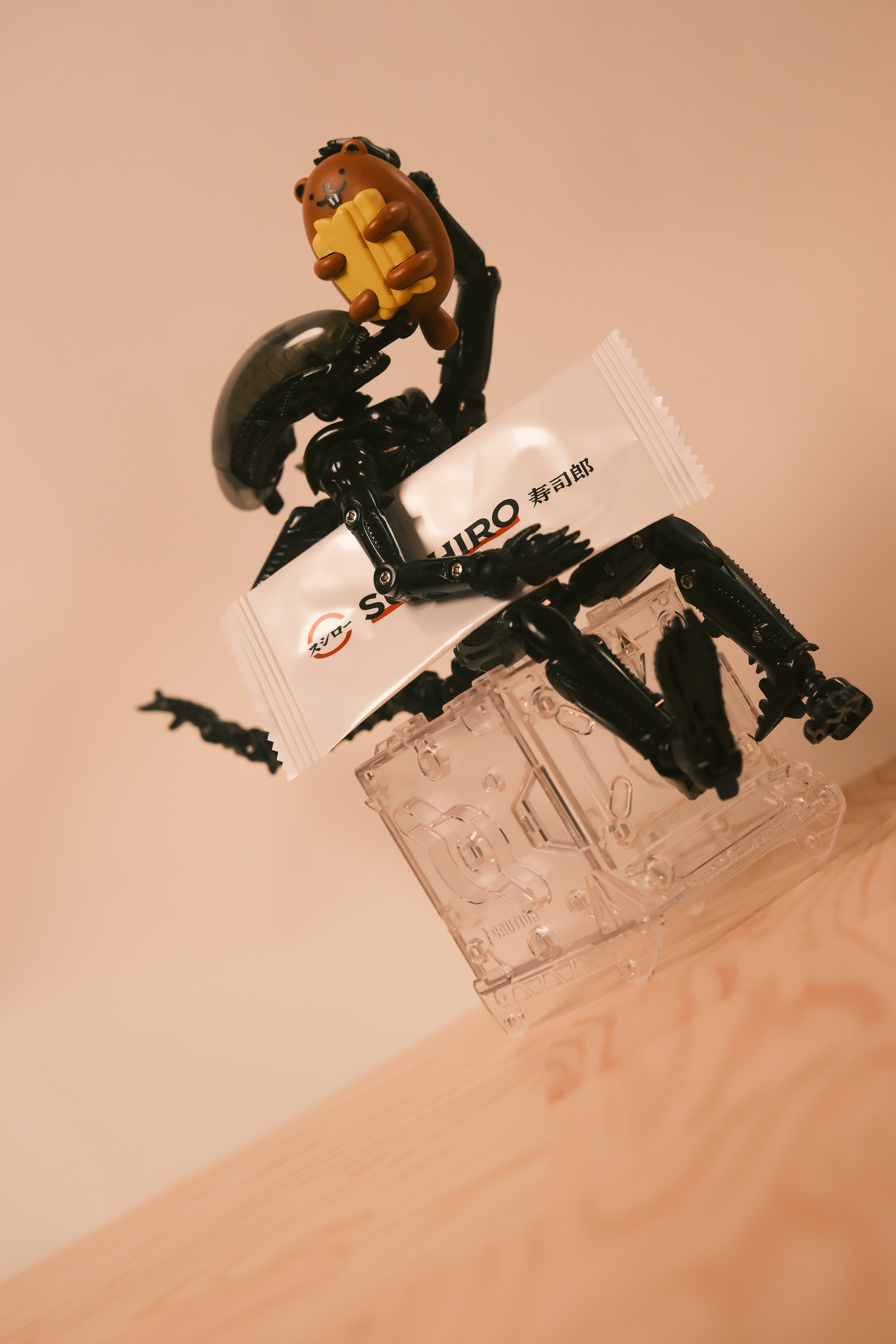 Tiny Hero: A Lego Toy Clown Mounts an Inquisitive Snack-Holder