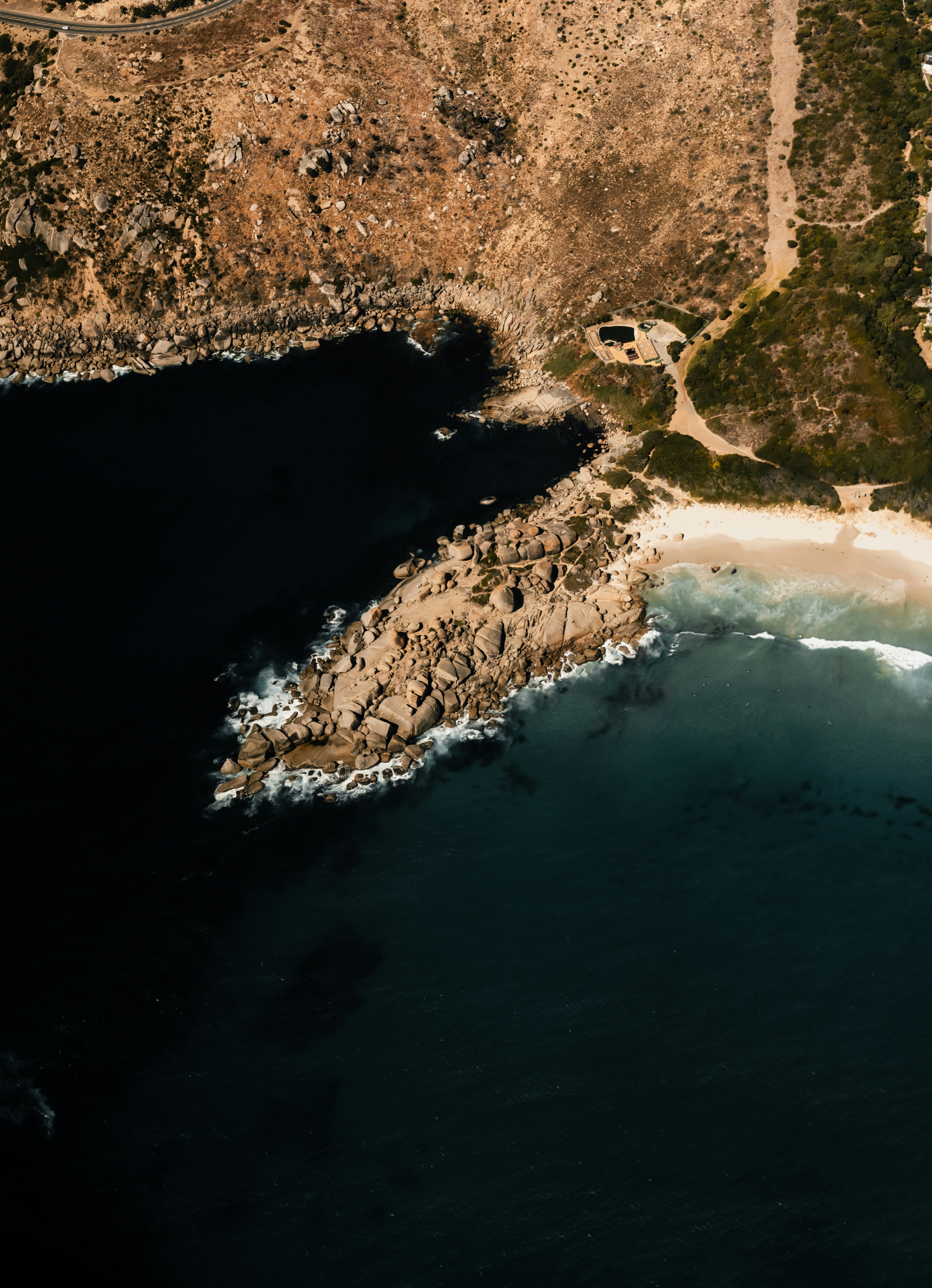 Cliffside Cove: Aerial Quiet by the Shore