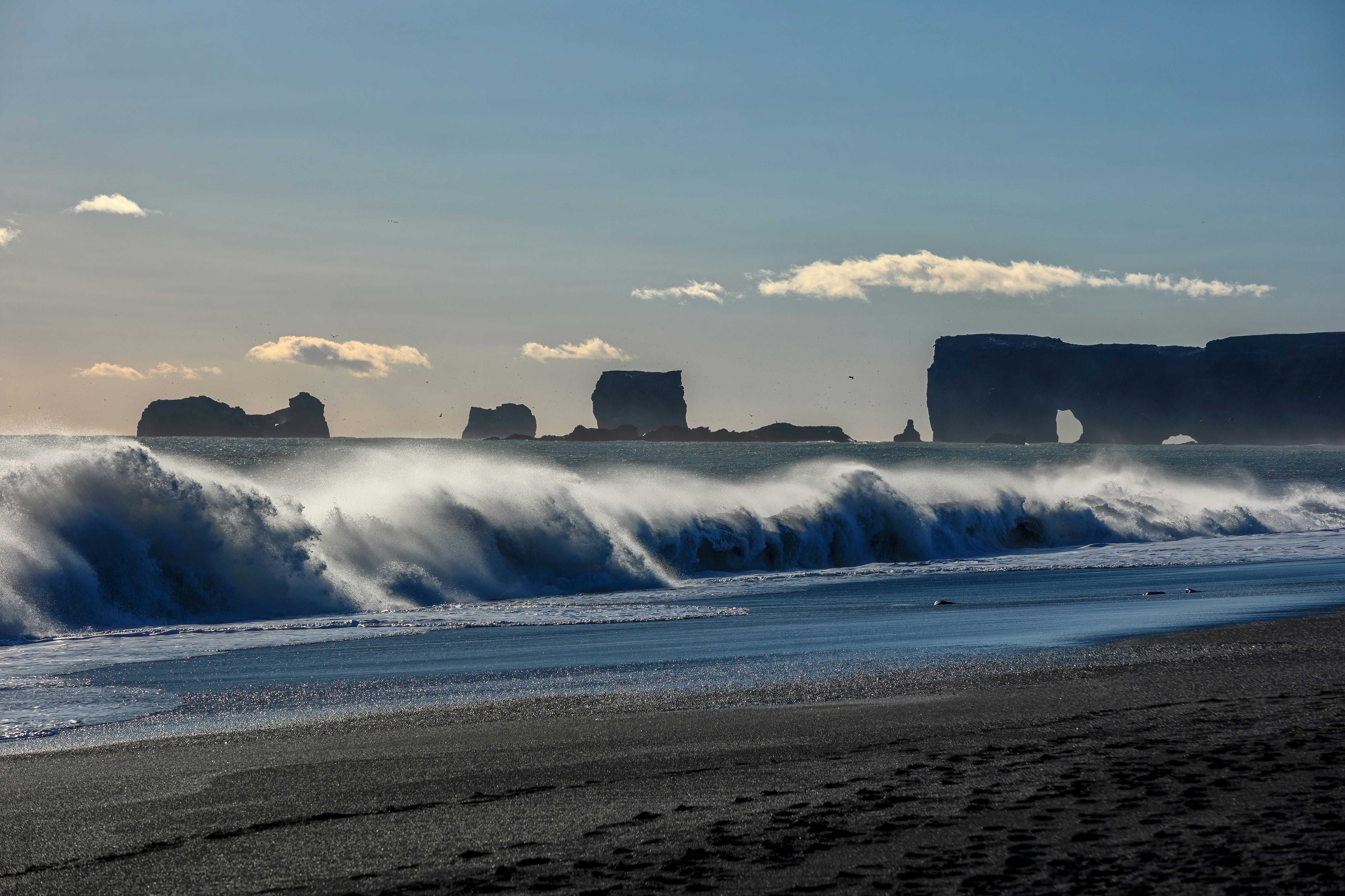 Sea Veil Over Basalt Cliffs at Dawn