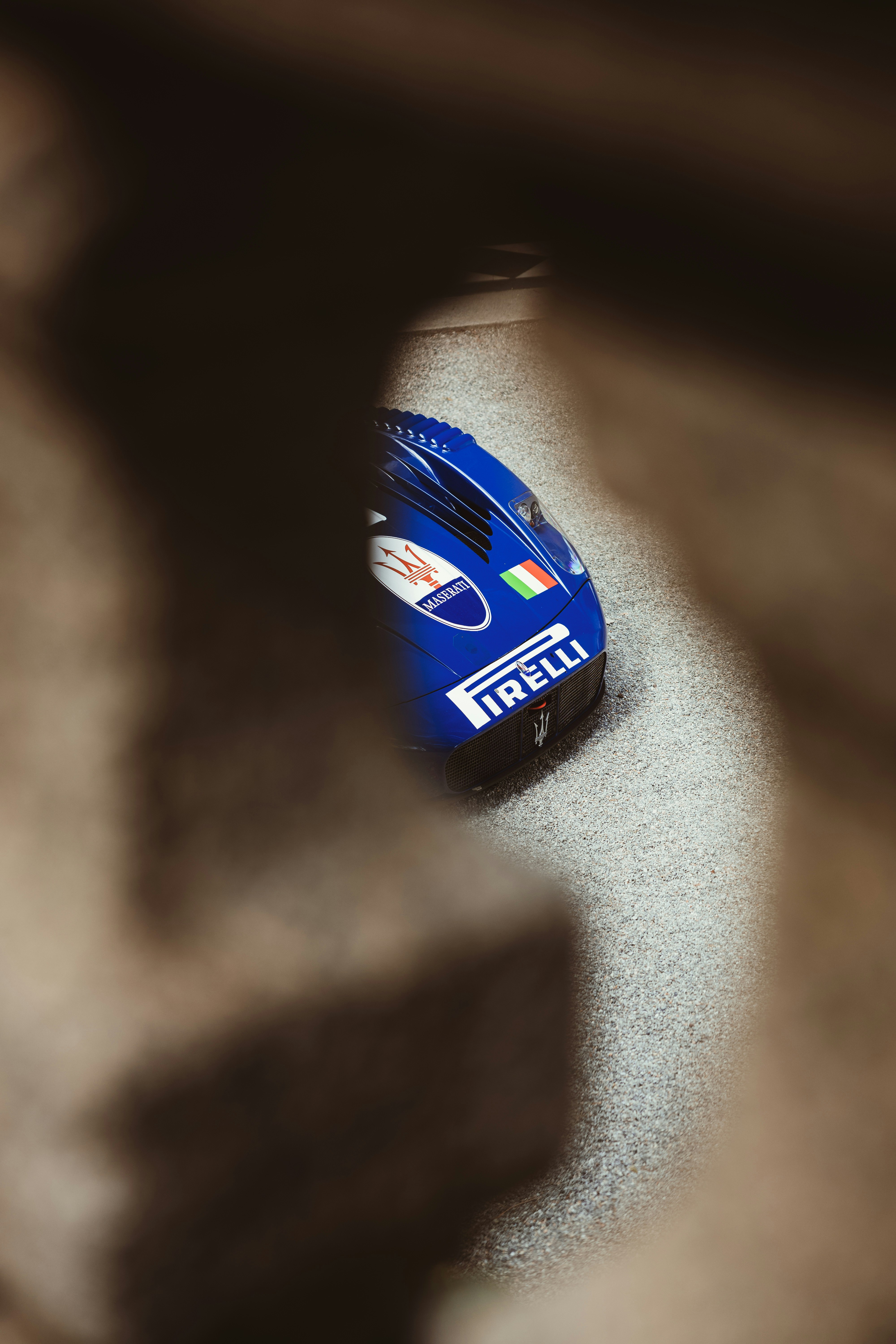 Blue Pirelli Racing Badge Through a Gap
