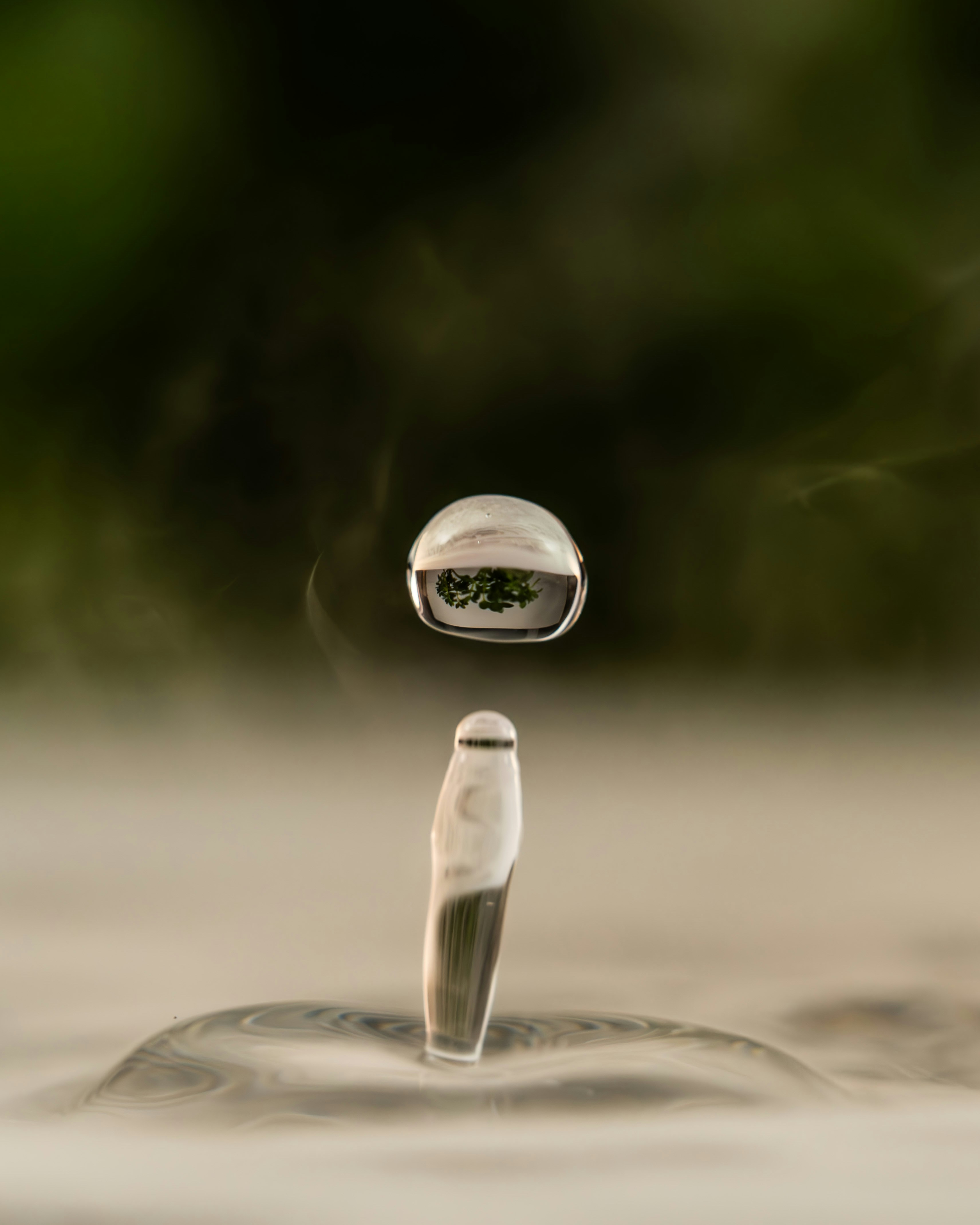 Floating Droplet: A Quiet Crown Over Rippling Surface