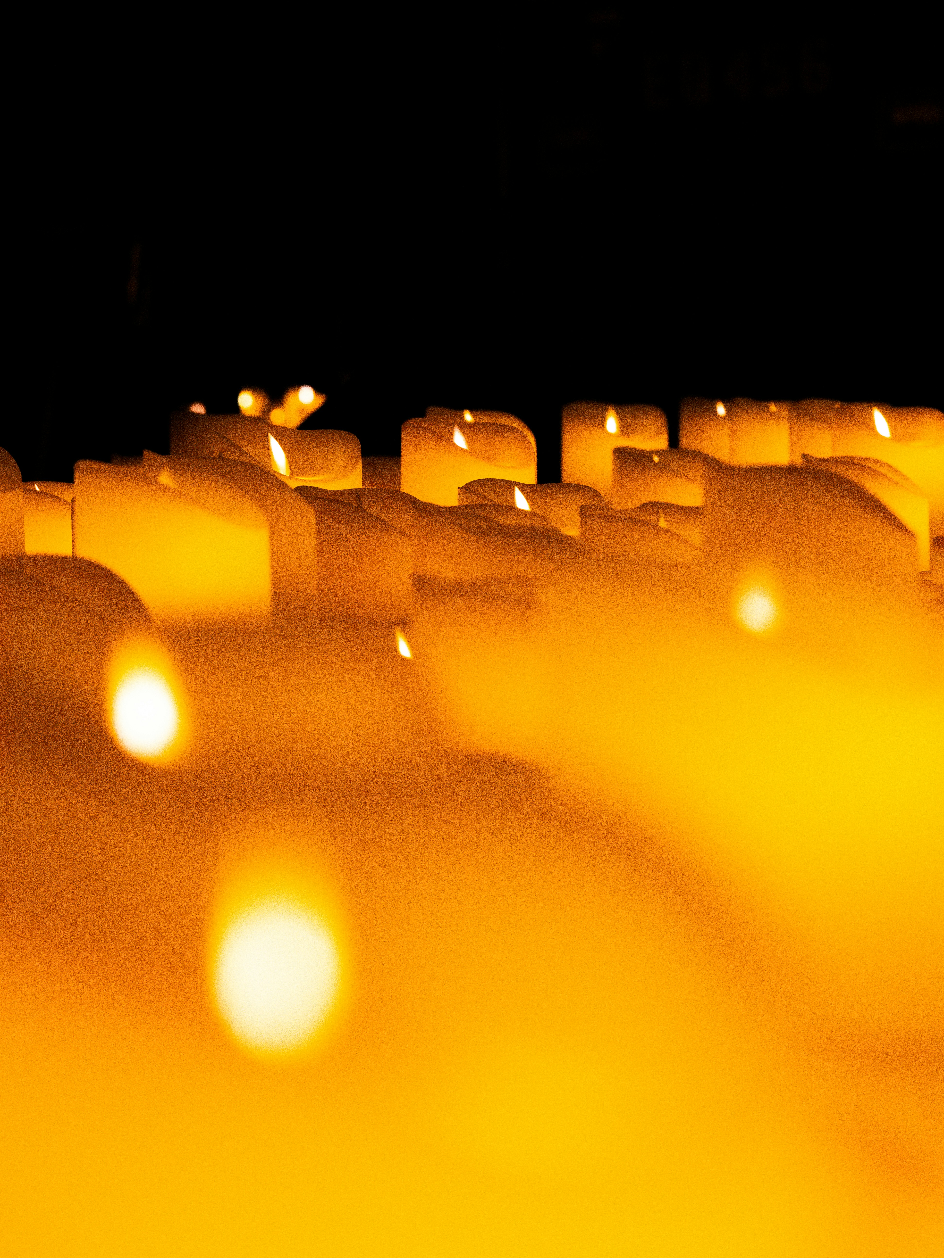 Halo of Light: A Sea of Waxen Candles in the Dark