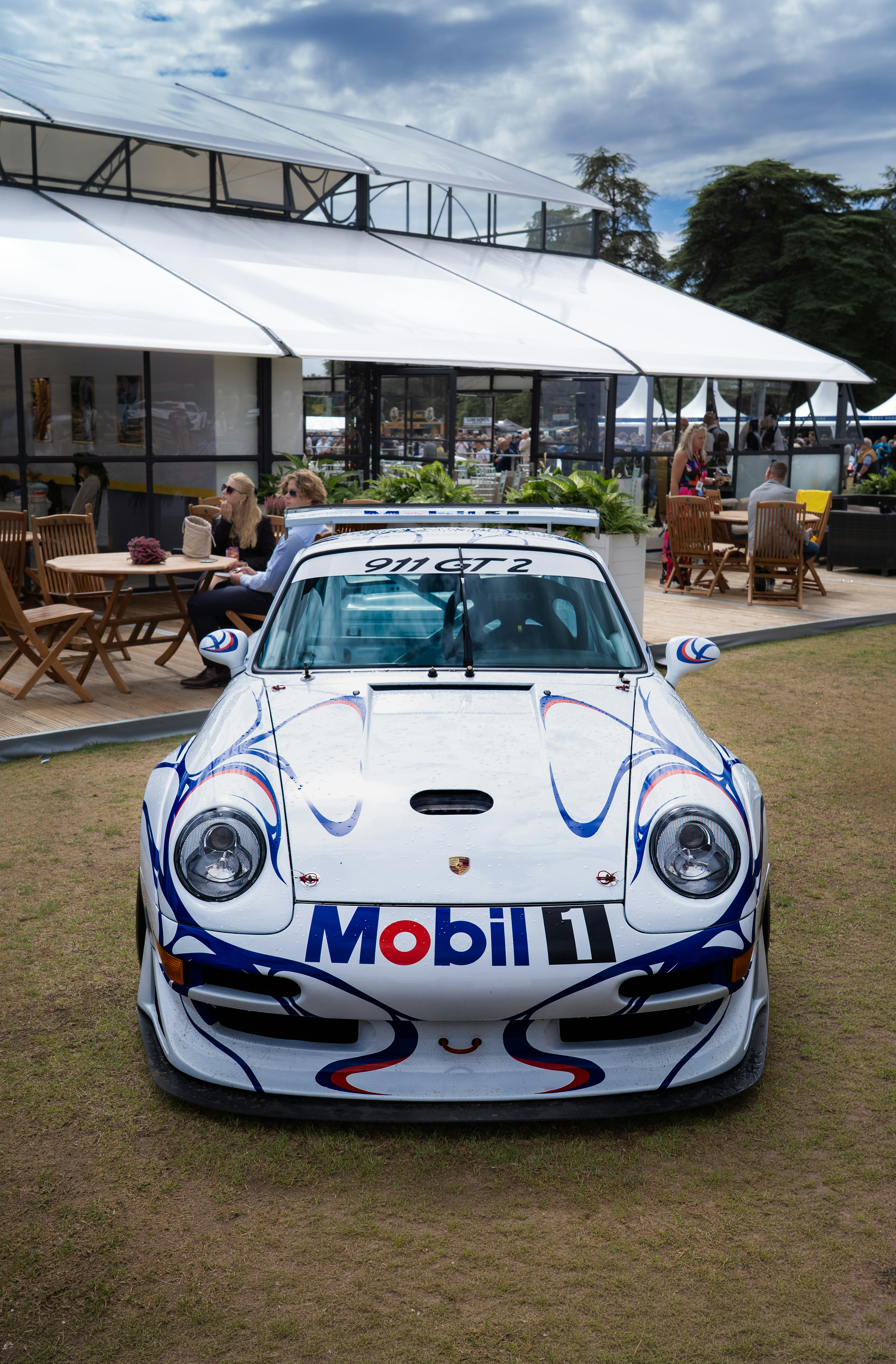 Porsche Mobil 1 GT1 on Display at Outdoor Café Event