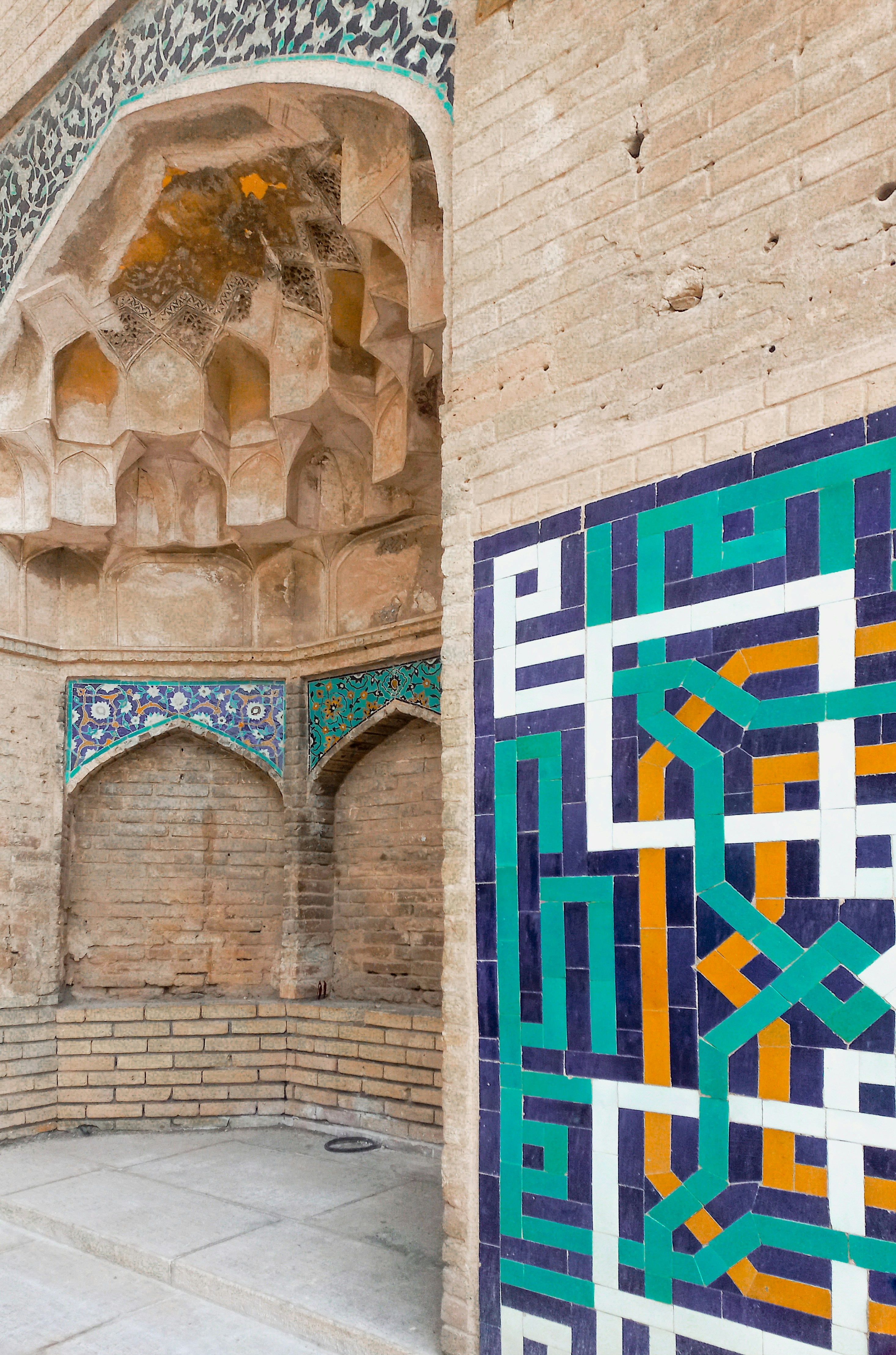 Geometric Tile Meets Brick Niche: An Architectural Mosaic Moment