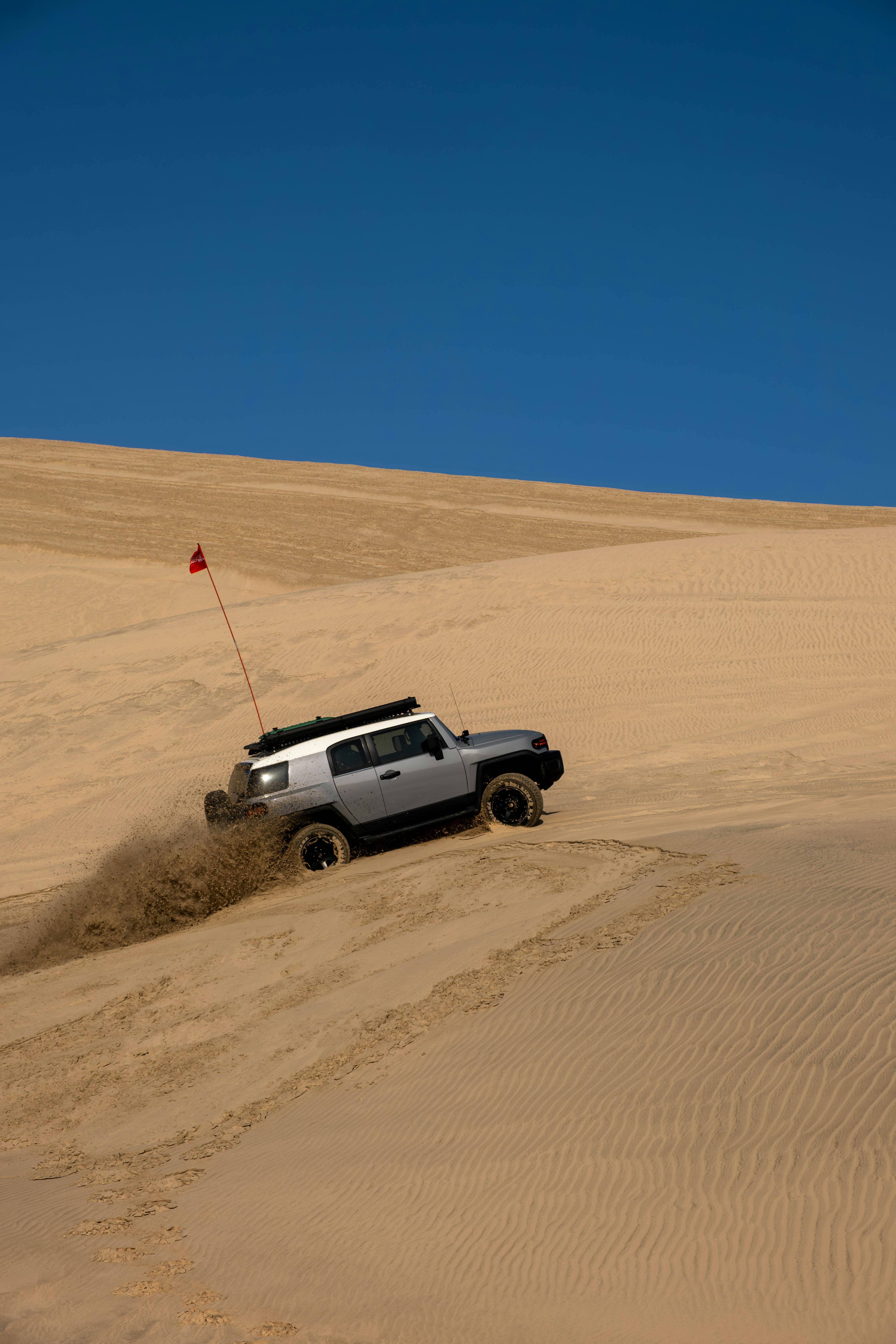 Dust Trail Descent: Desert Expedition in a Silver 4x4