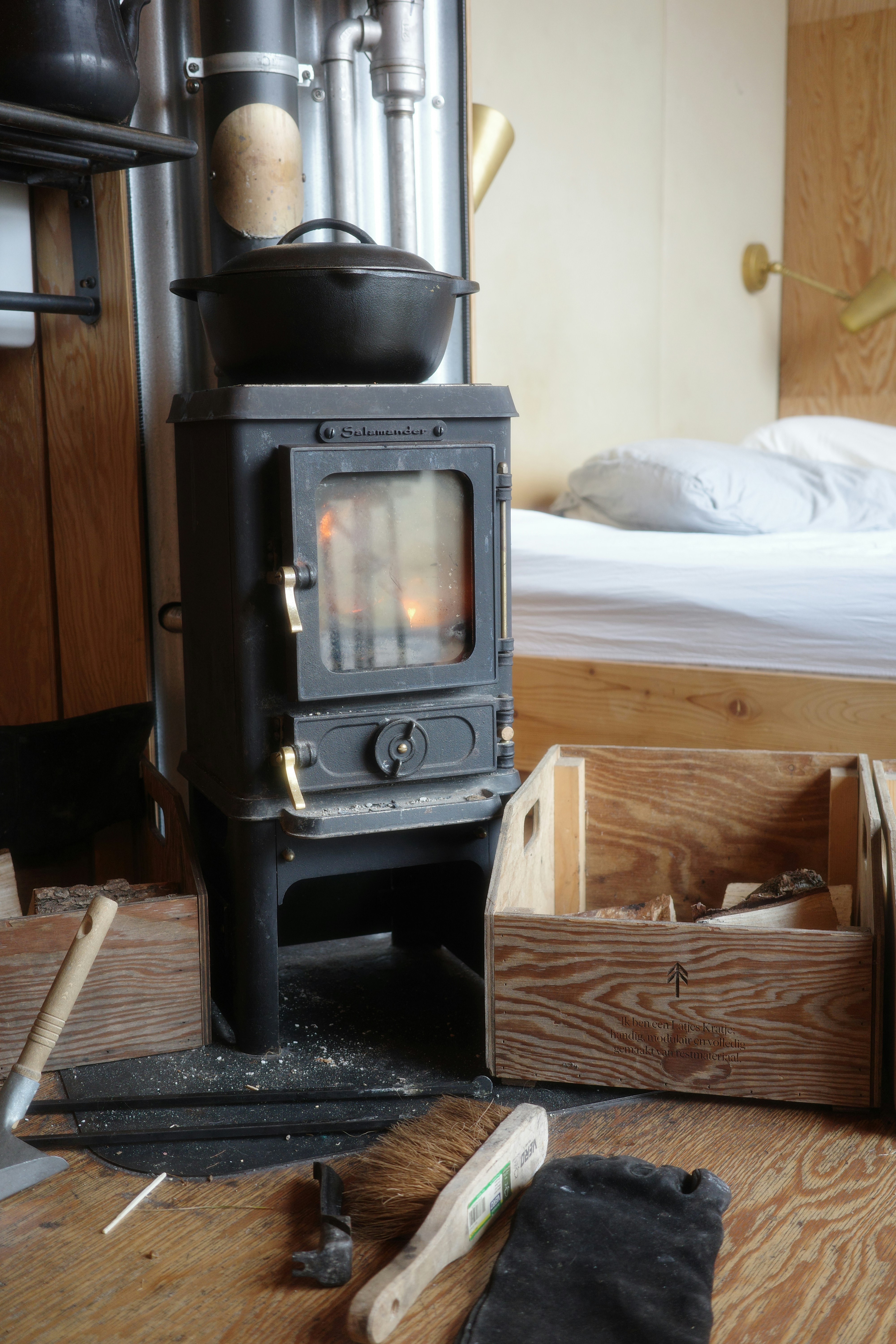 Warmth and Steam: A Rustic Stove Ignites a Cozy Corner