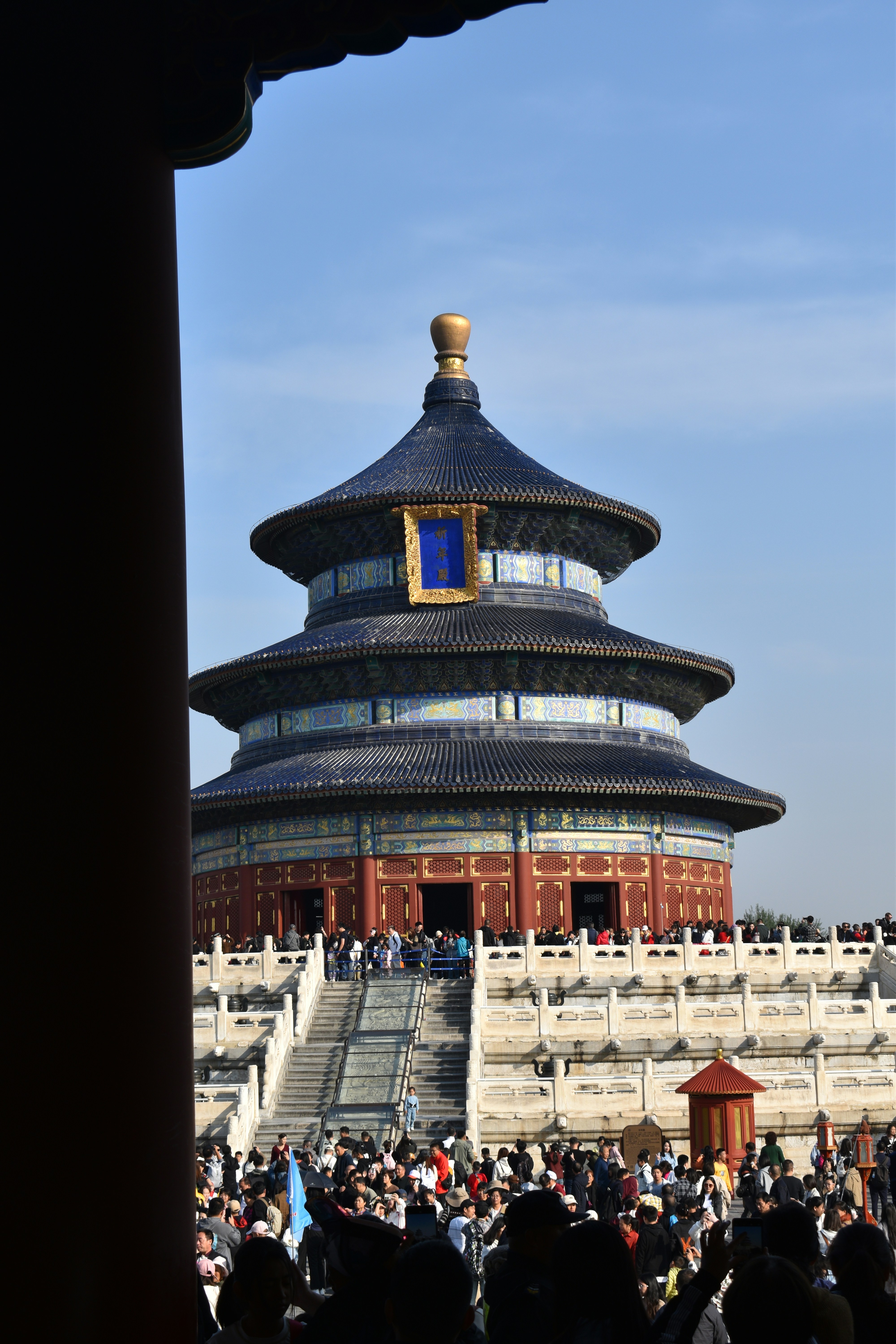 Temple of Heaven: A Blue-Tiled Tiered Roof Surging Above a Sea of Visitors