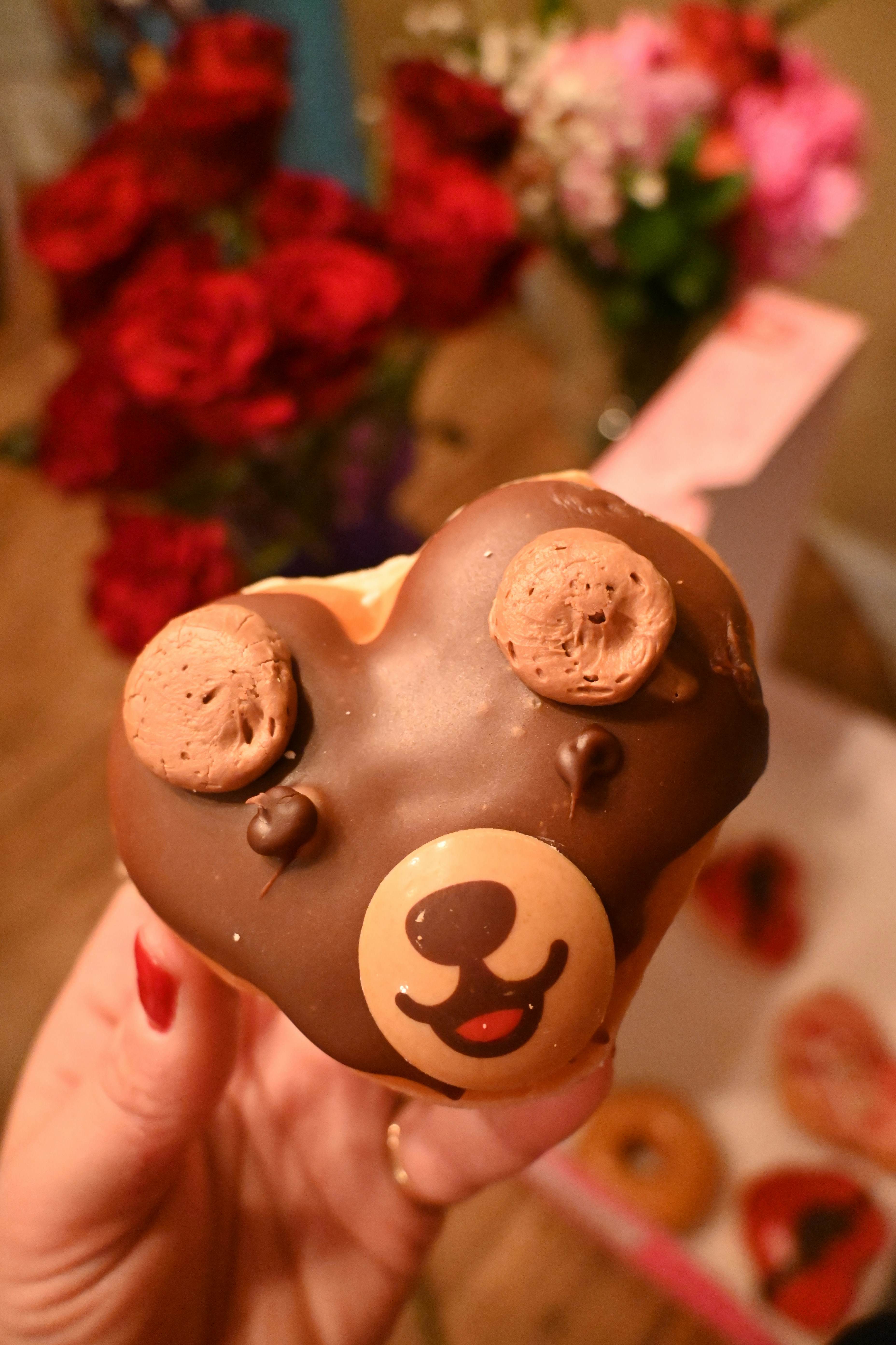 Sweet Bear, Chocolate Smile: A Donut Fondant Face in Focus