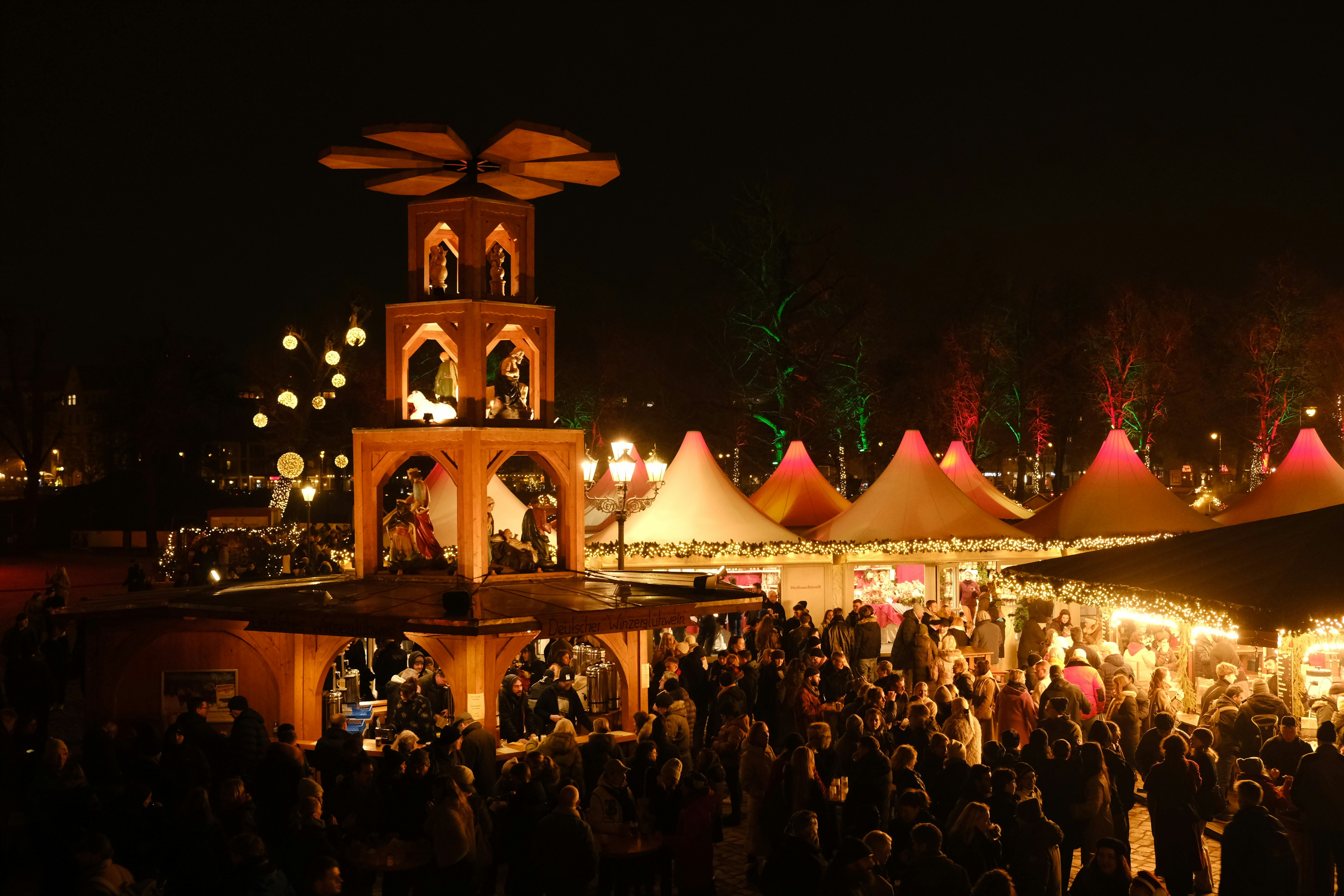 Illuminated Festival Altar: A Towering Lantern Amid Night Market Glee