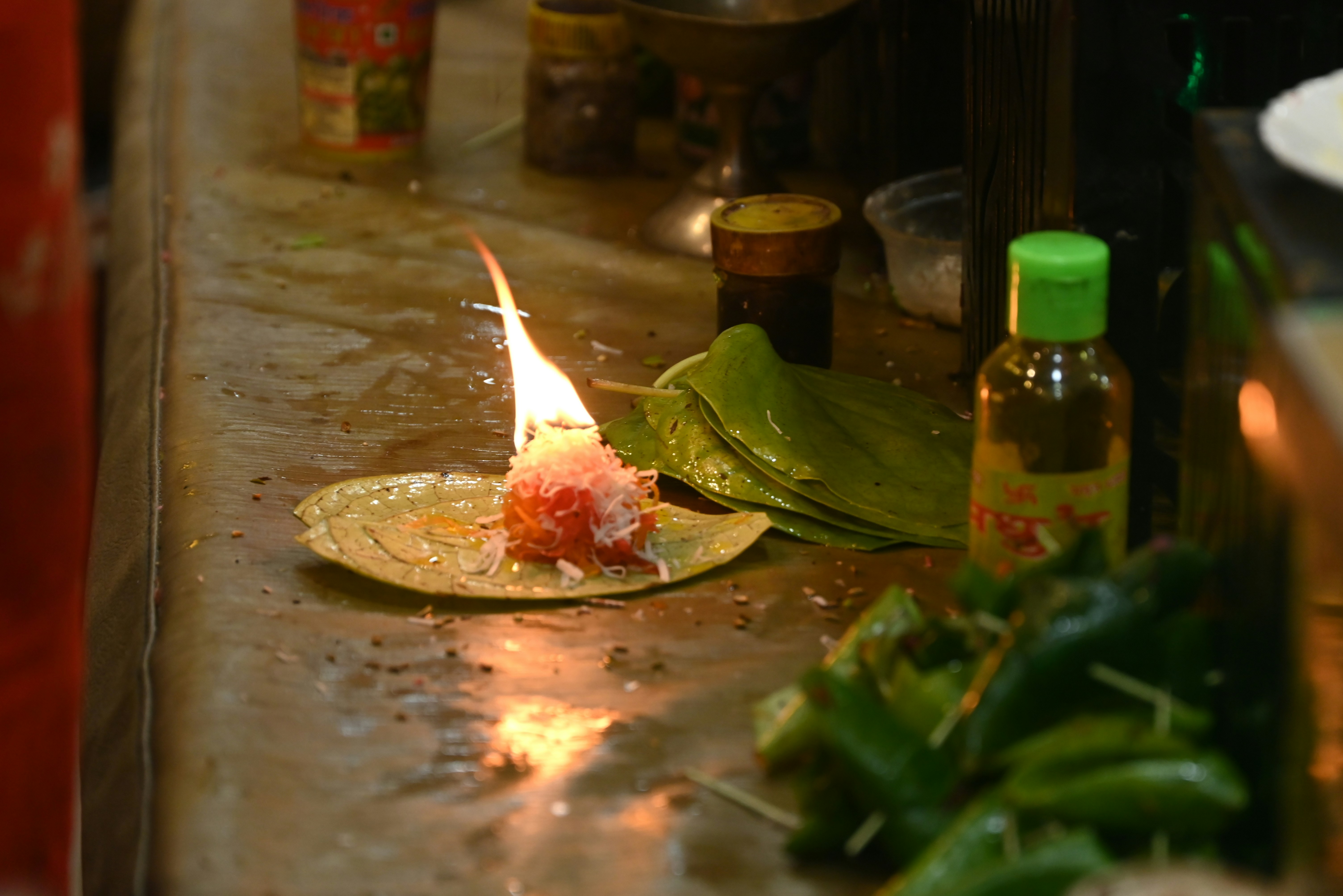 Flame on a Leaf: a Ritual of Fire on a Kitchen Counter