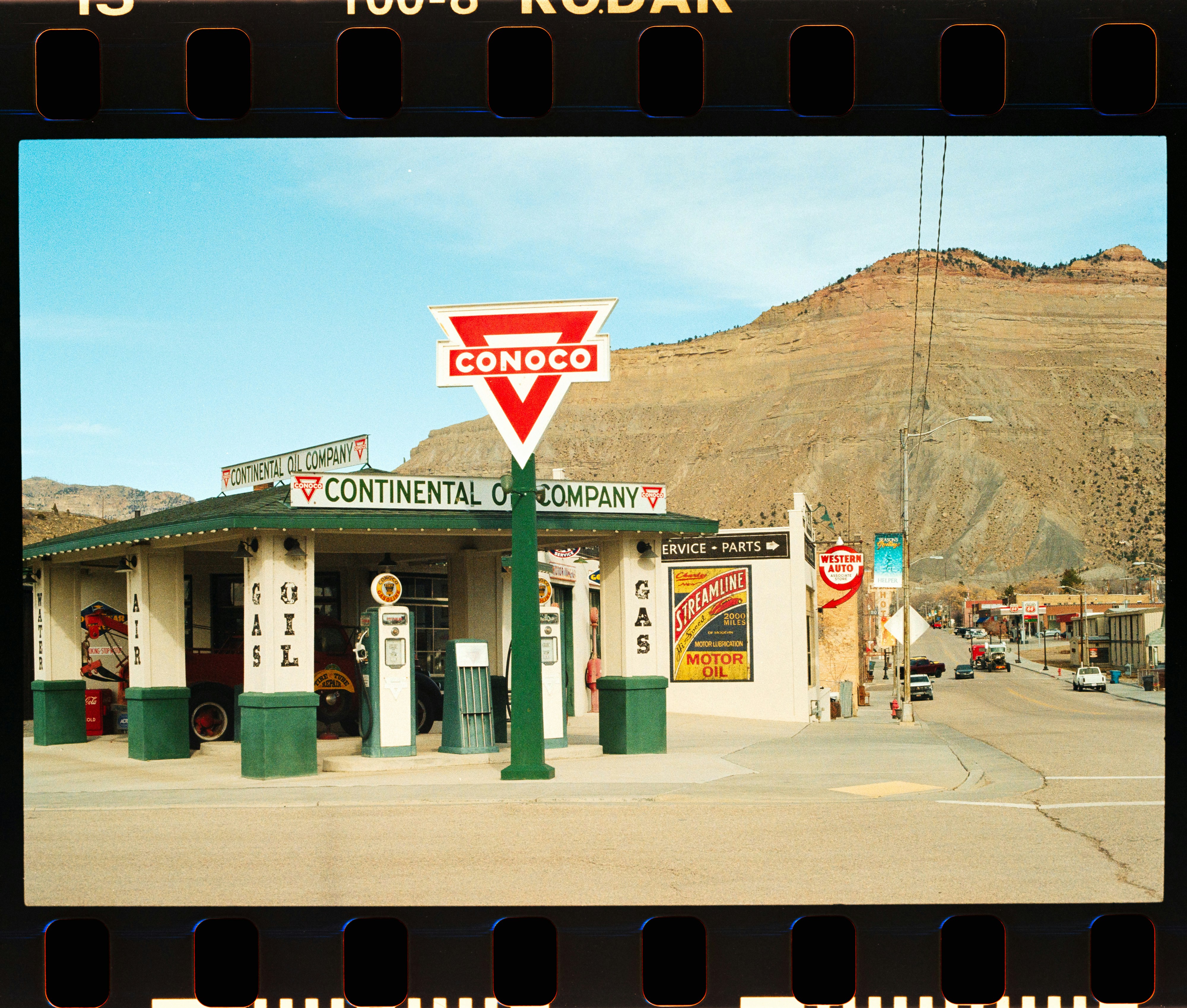 Conoco Nostalgia: A Lone Gas Station Amid Desert Slopes