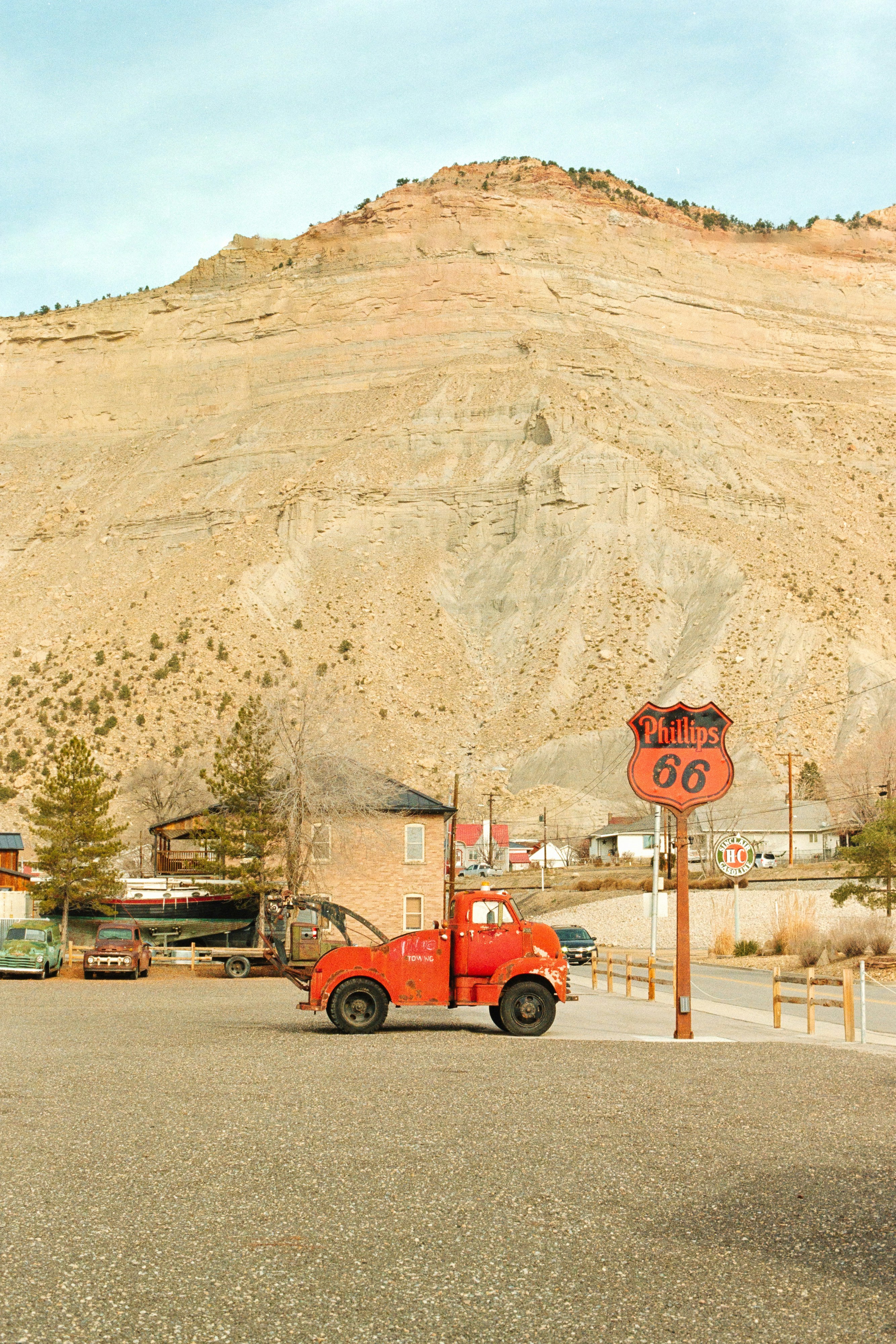 Red Vintage Truck at the Edge of a Desert Cliff