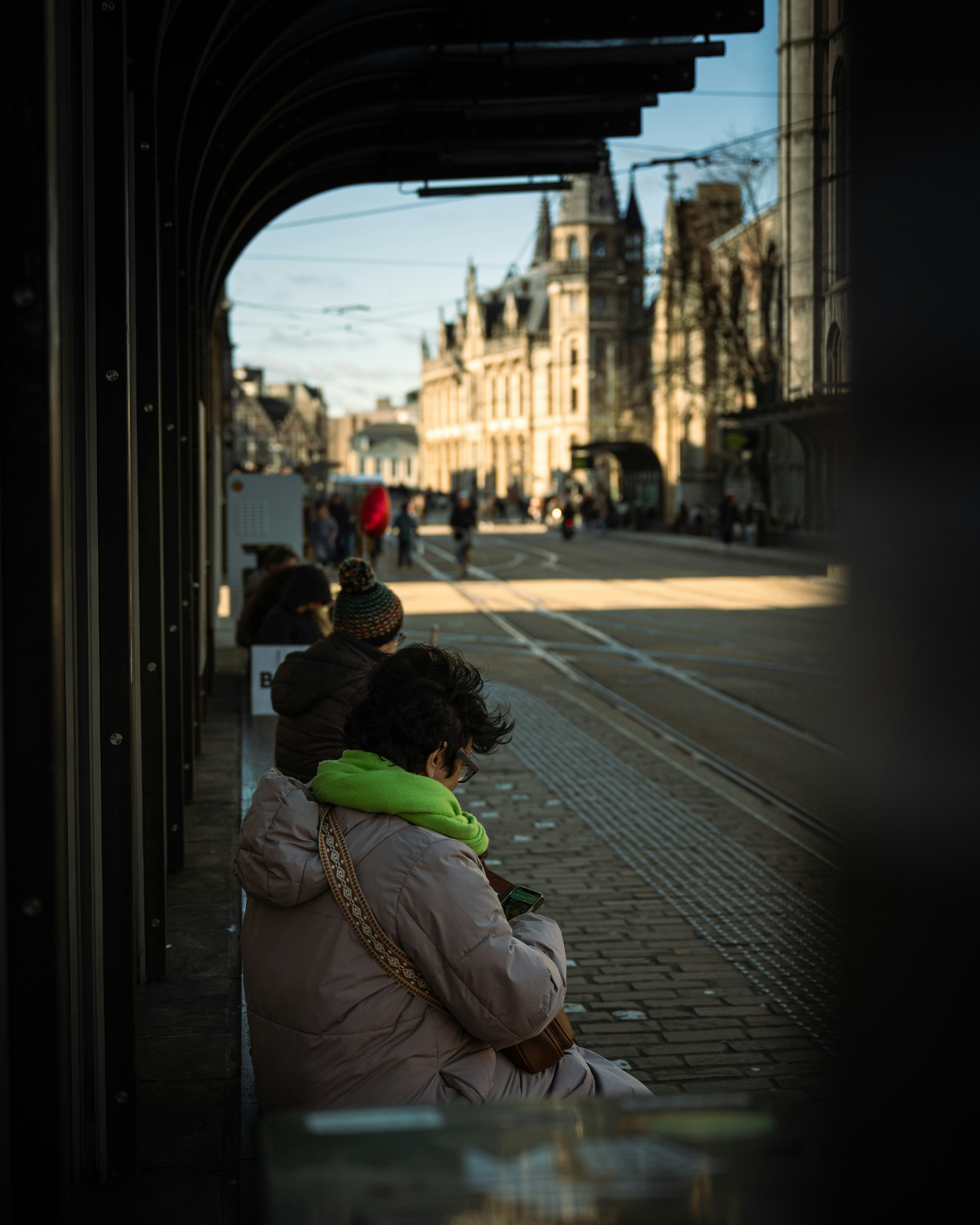 City Platform Quiet: A Passenger Strikes a Moment of Pause