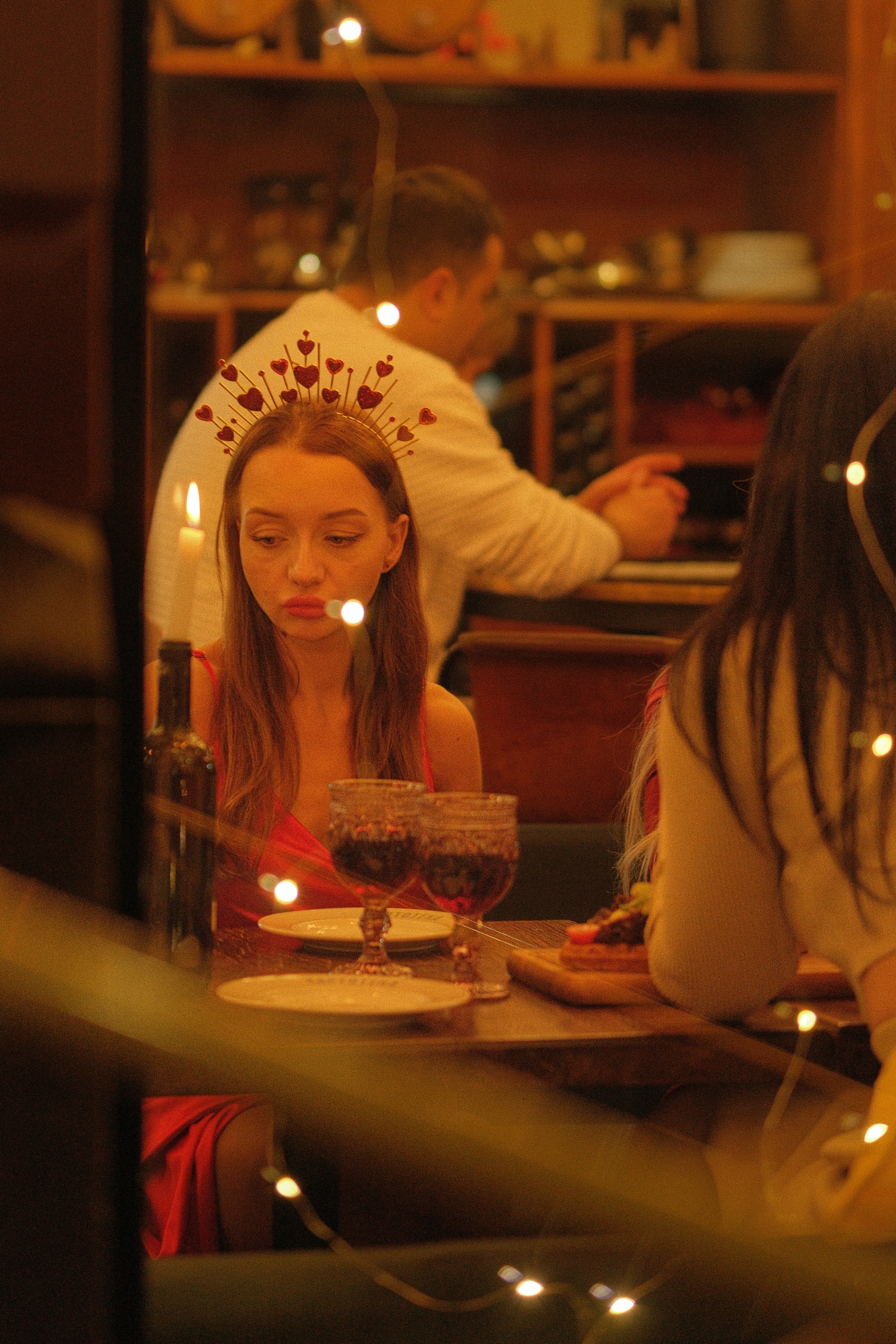 Mid-Meal Contemplation Under Candlelight
