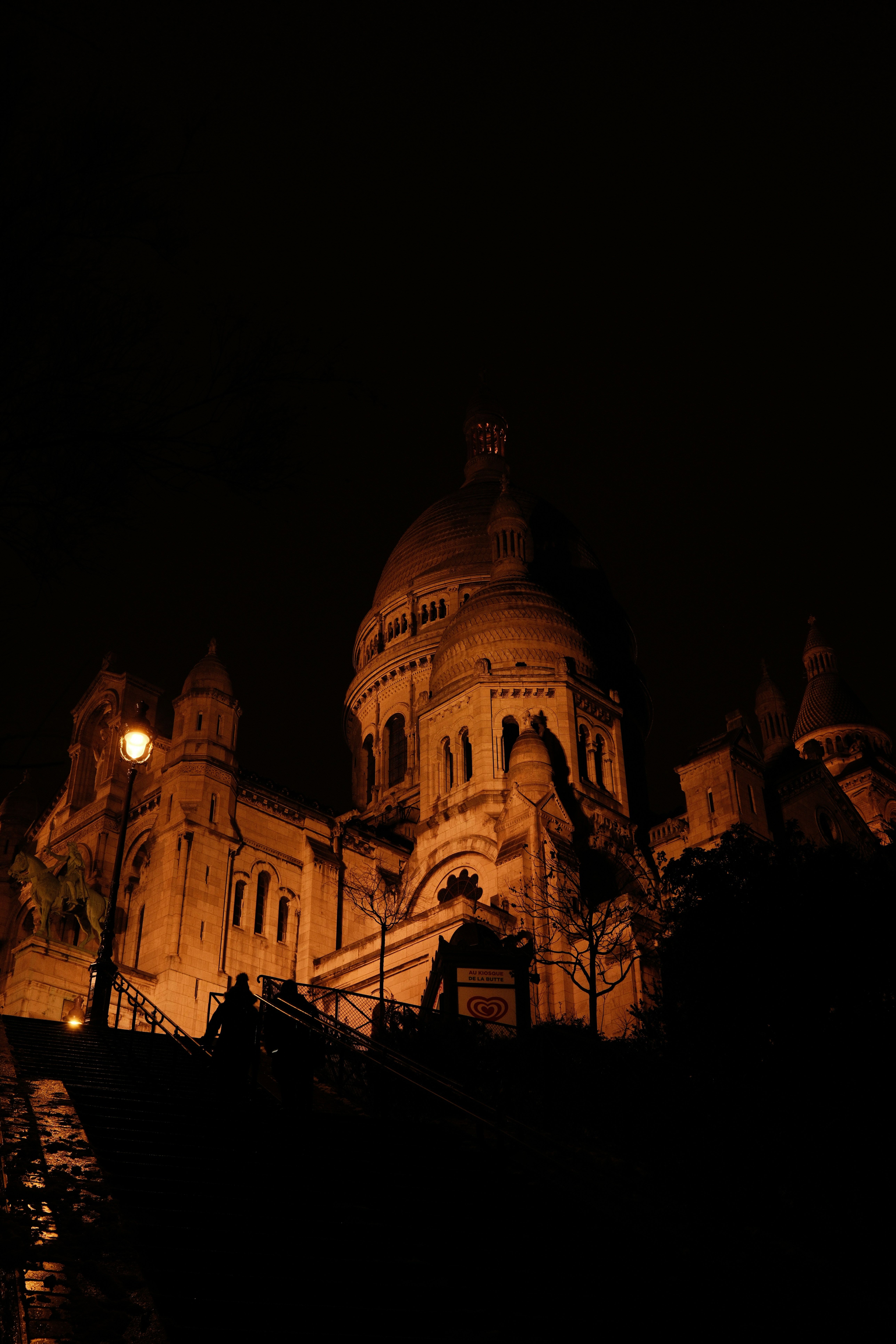 Night Ascend: A Cathedral Bathed in Warm Streetlight