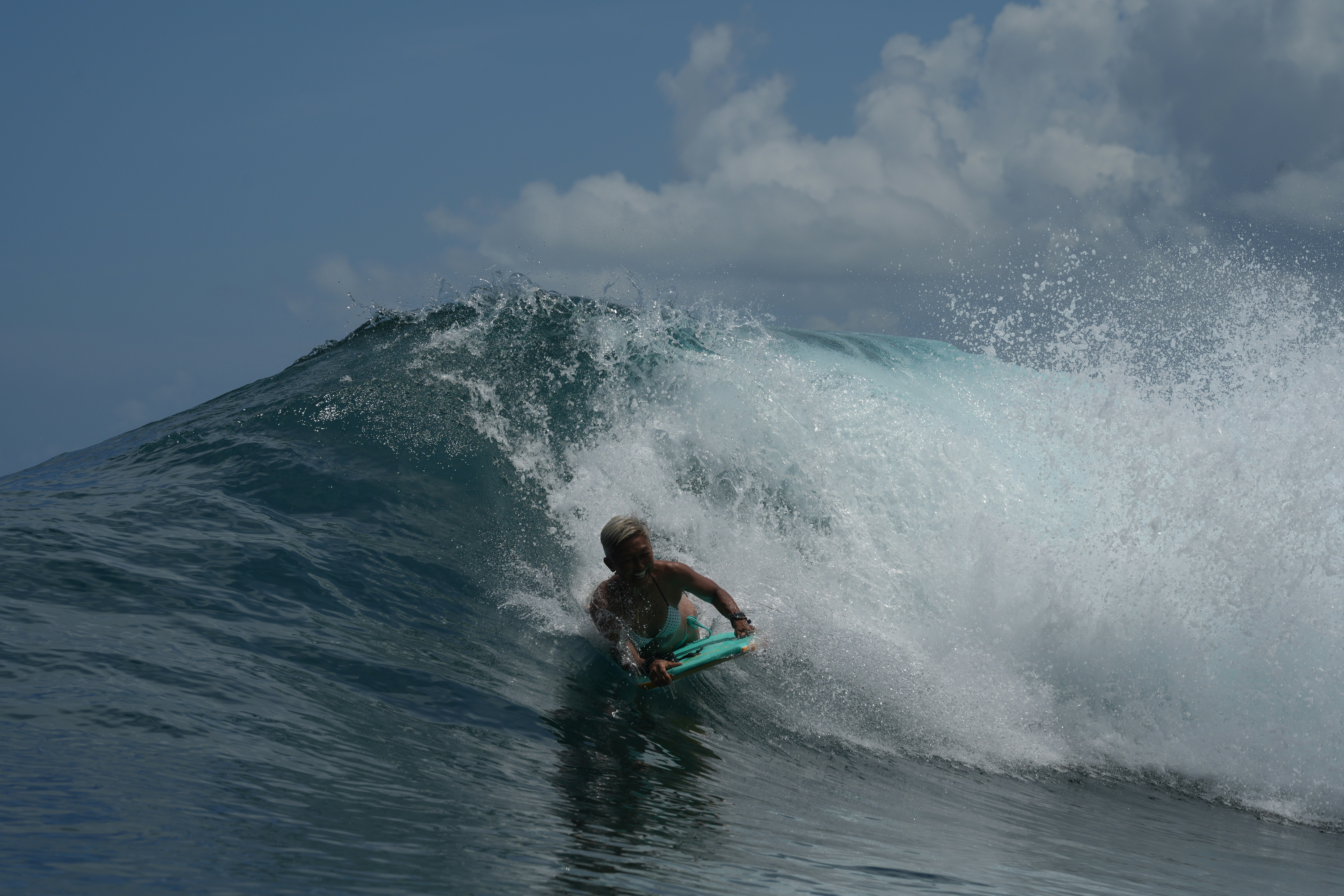 Surfing the Barrel: Rider Carves Inside a Crashing Wave