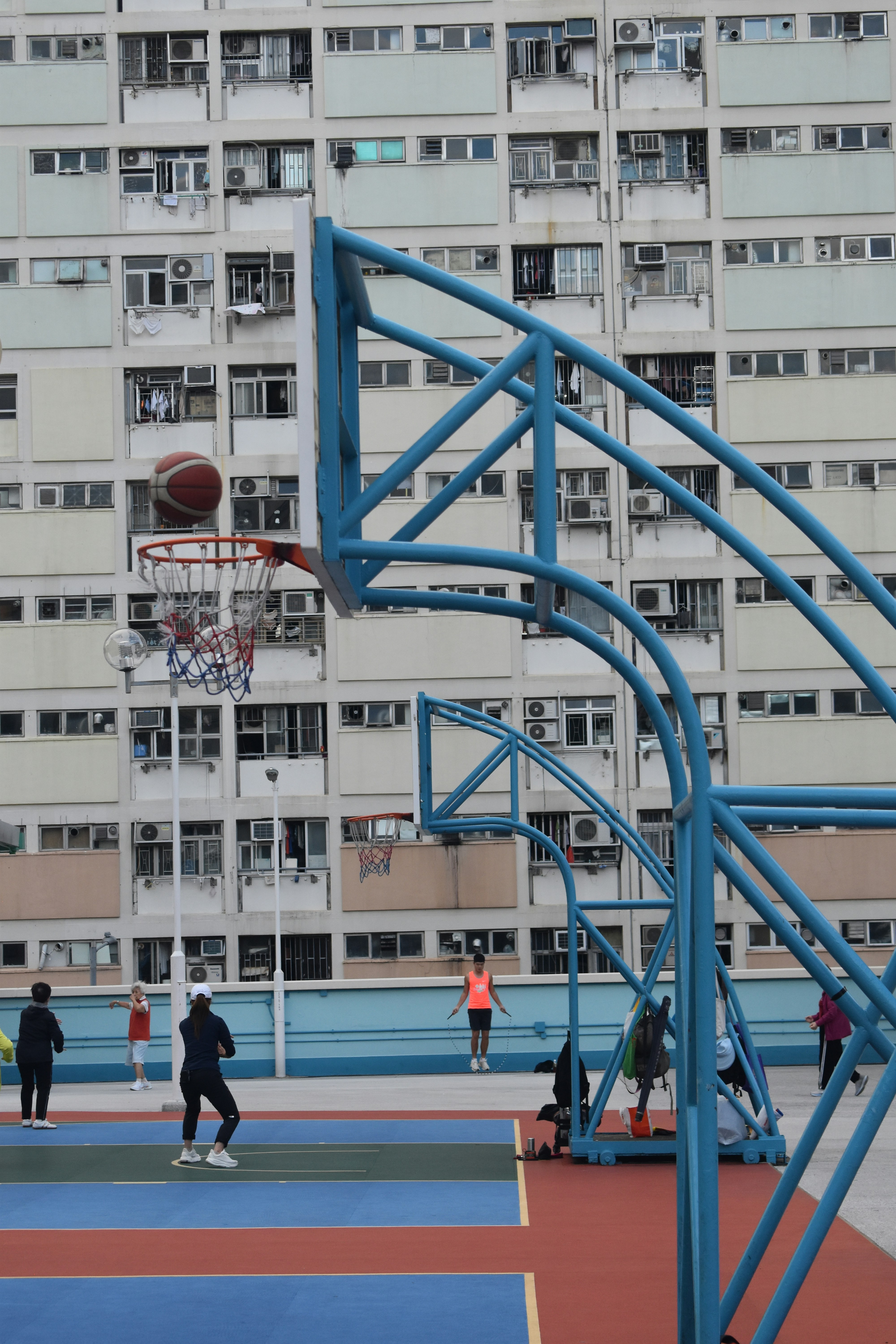 Blue Geometry and Moving Players on a Colorful Outdoor Court