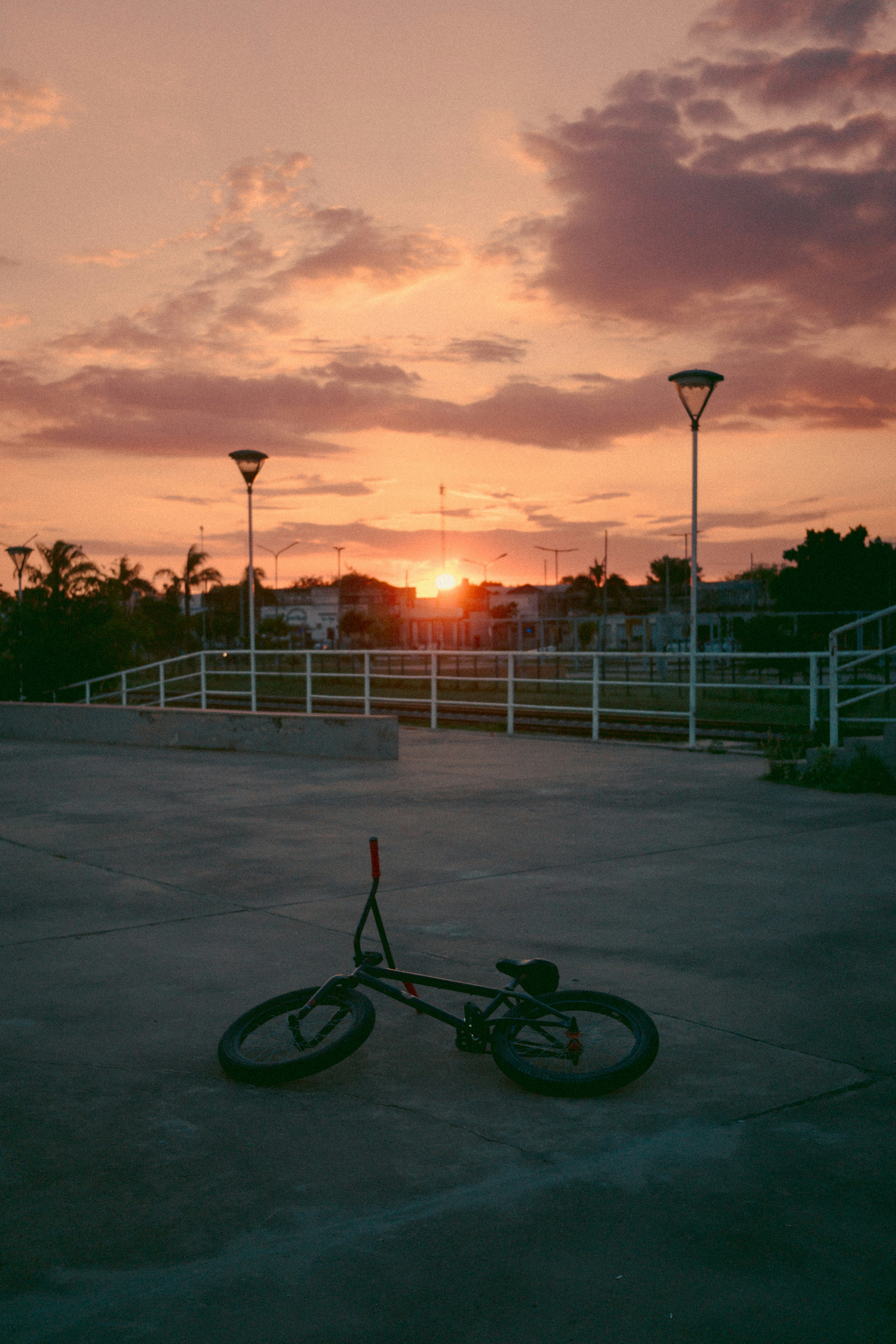 Sunset Rolloff: A Parked Bicycle at Dusk