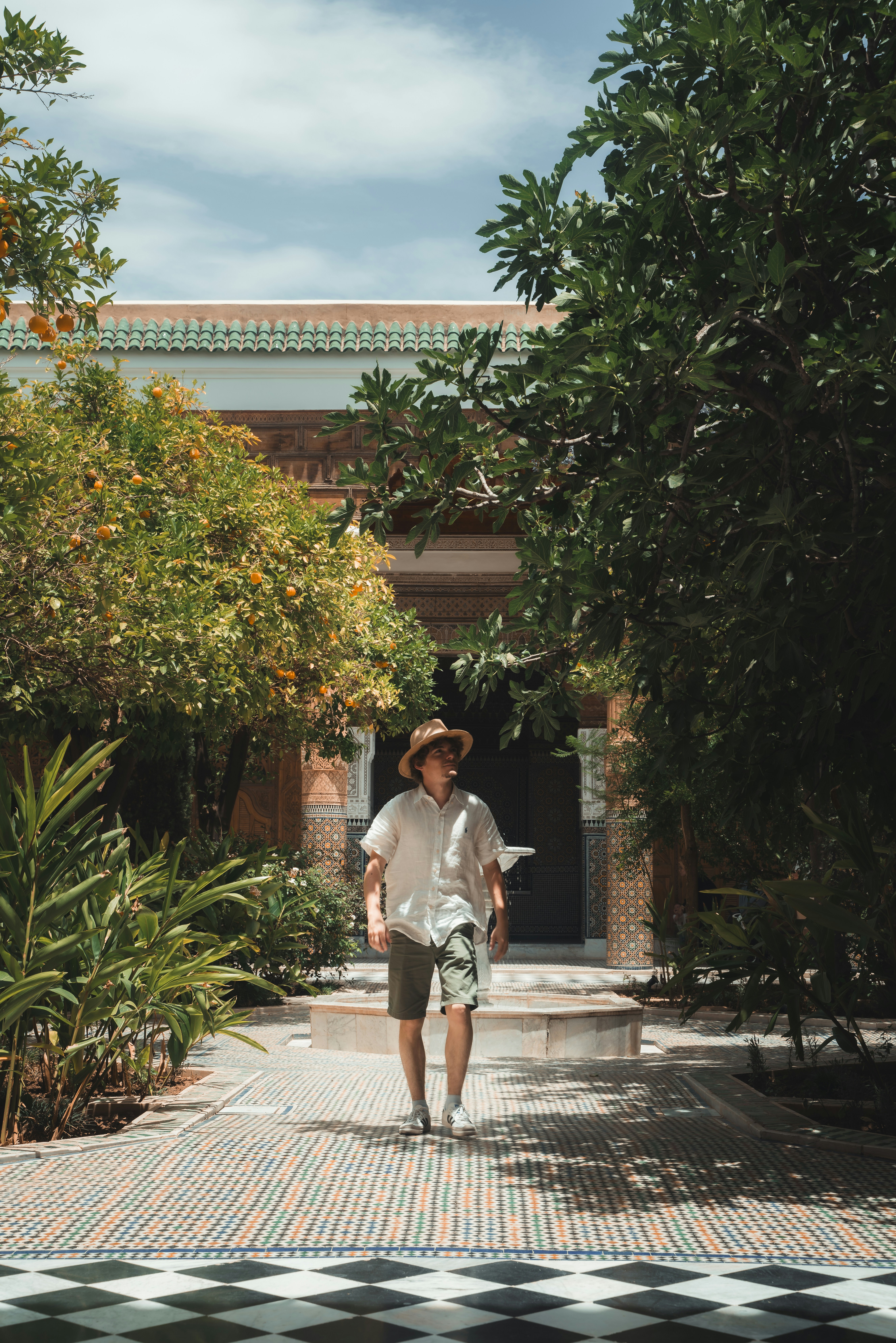 The Courtyard Stroll: A Sunlit Moment in the Tile‑Patterned Oasis