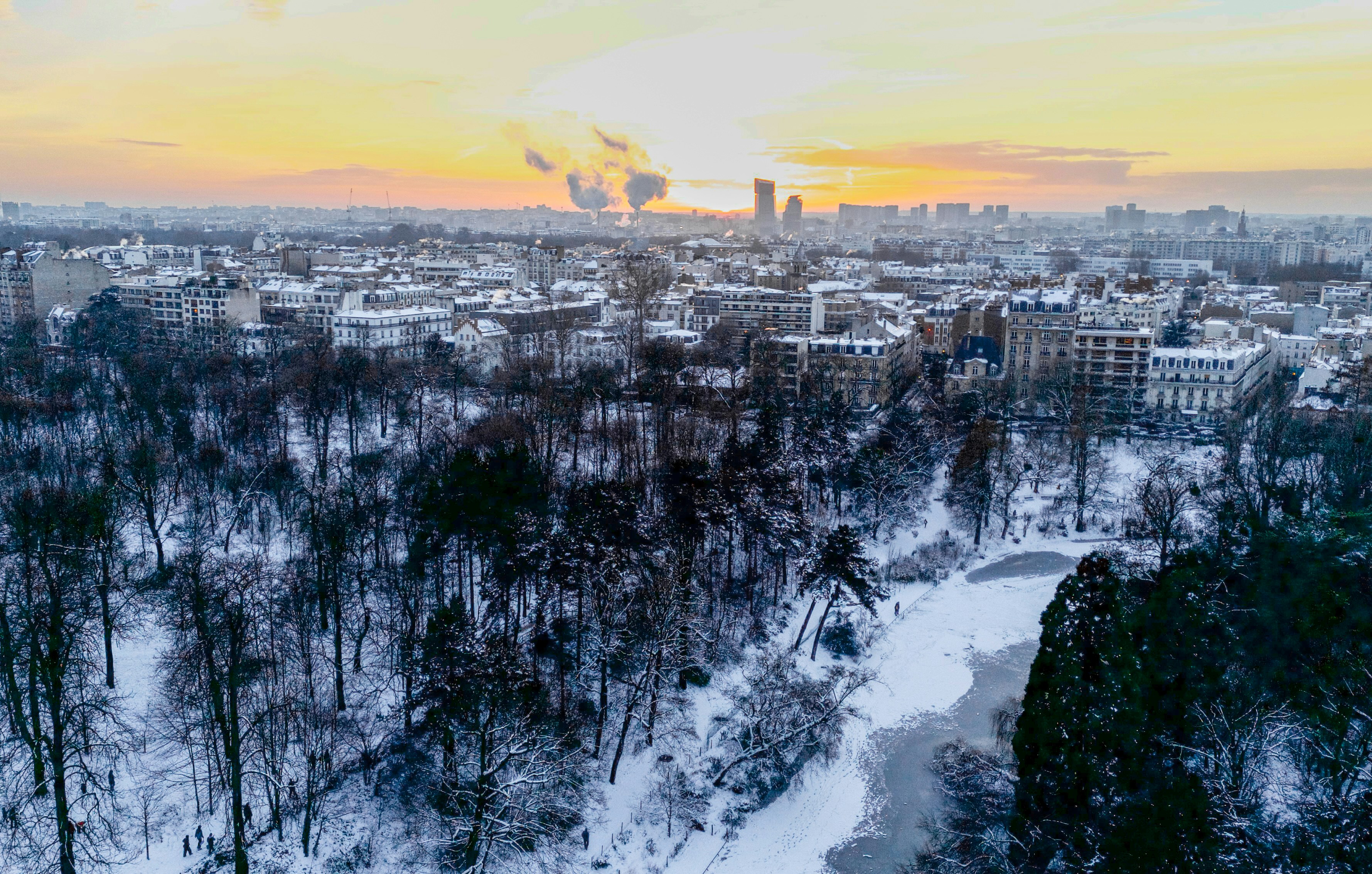 Sunset over a Snow-Swept Urban Crest
