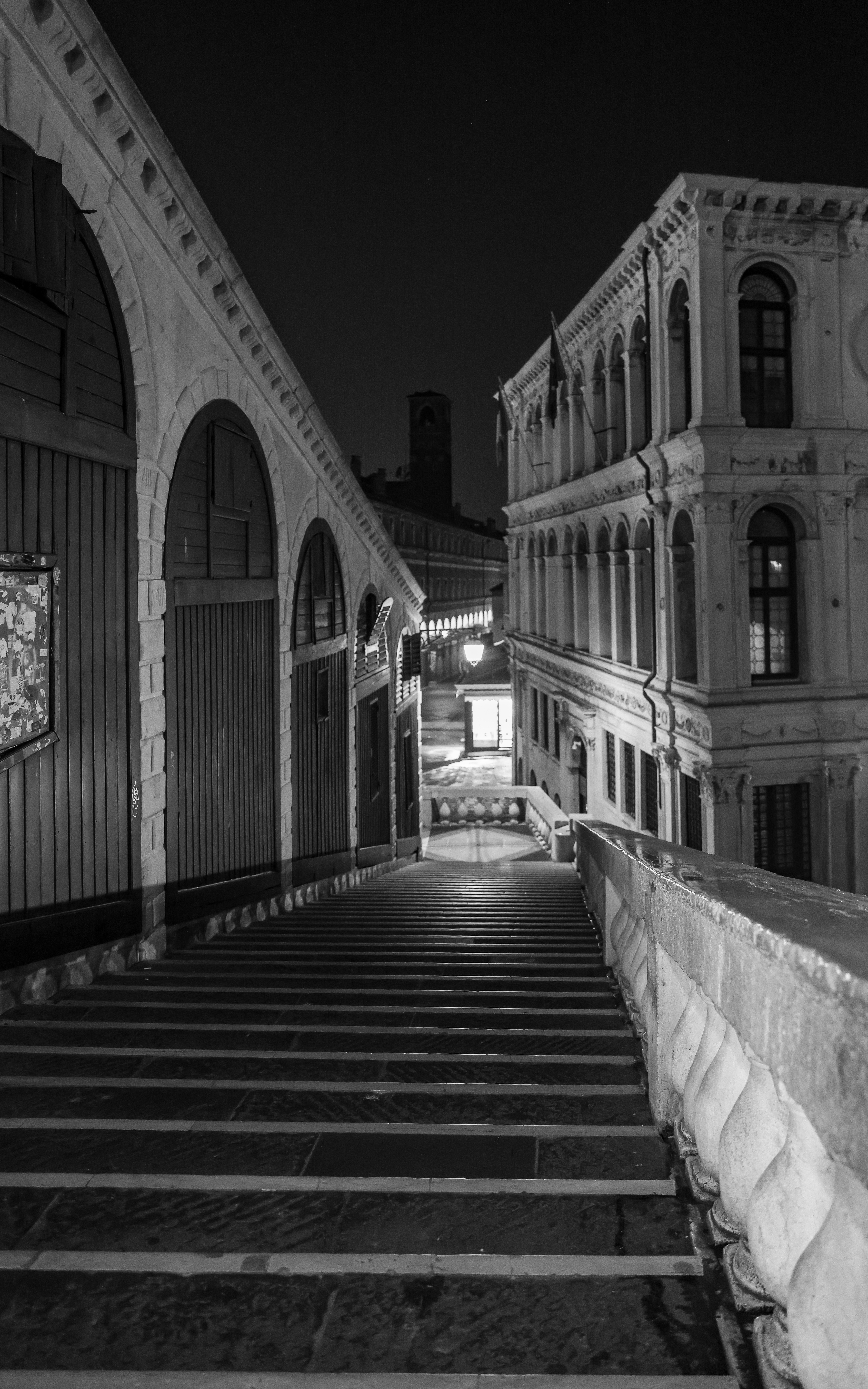 Midnight Staircase Between Ancient Facades