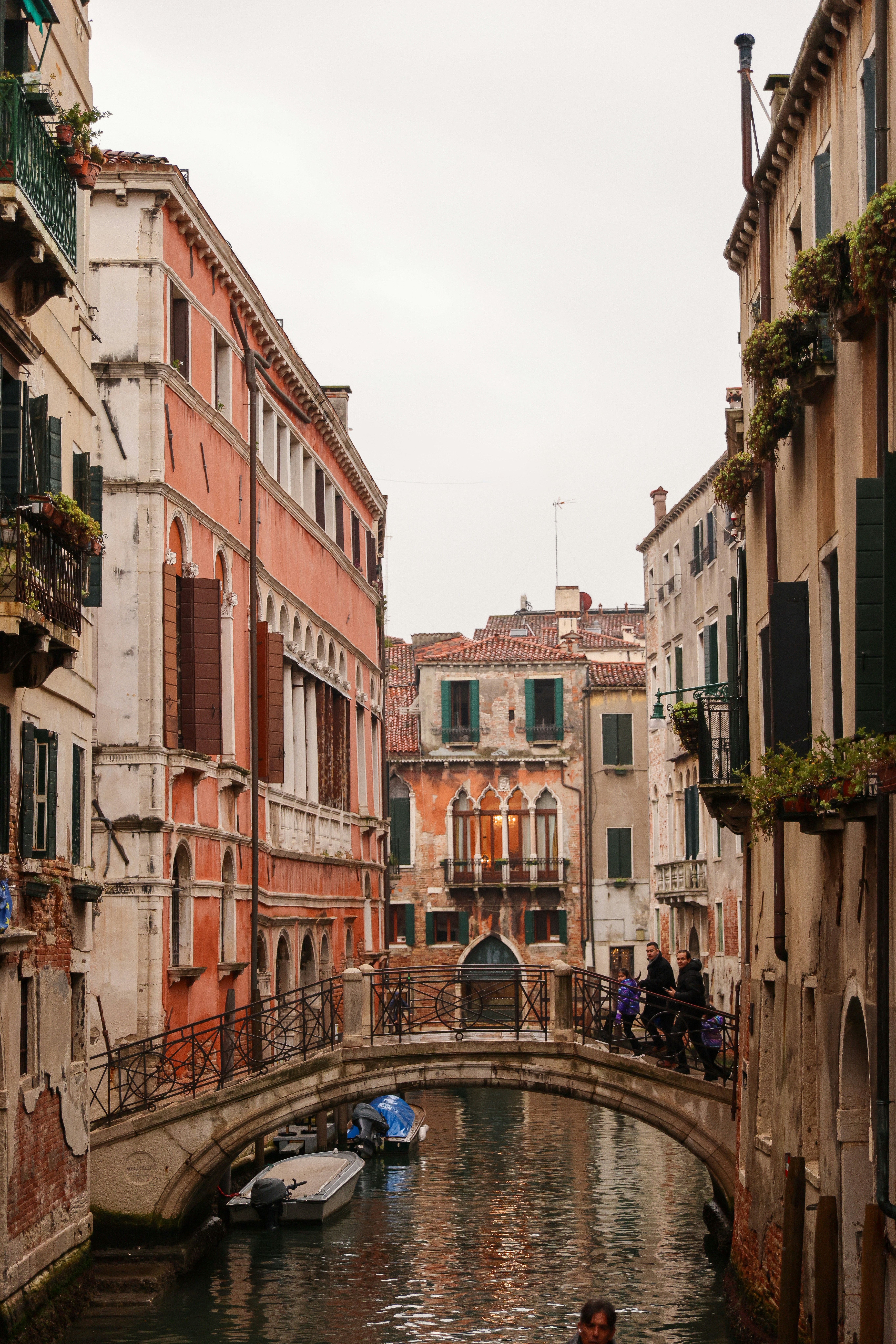Canal Corridor: Weathered Facades and a Narrow Bridge