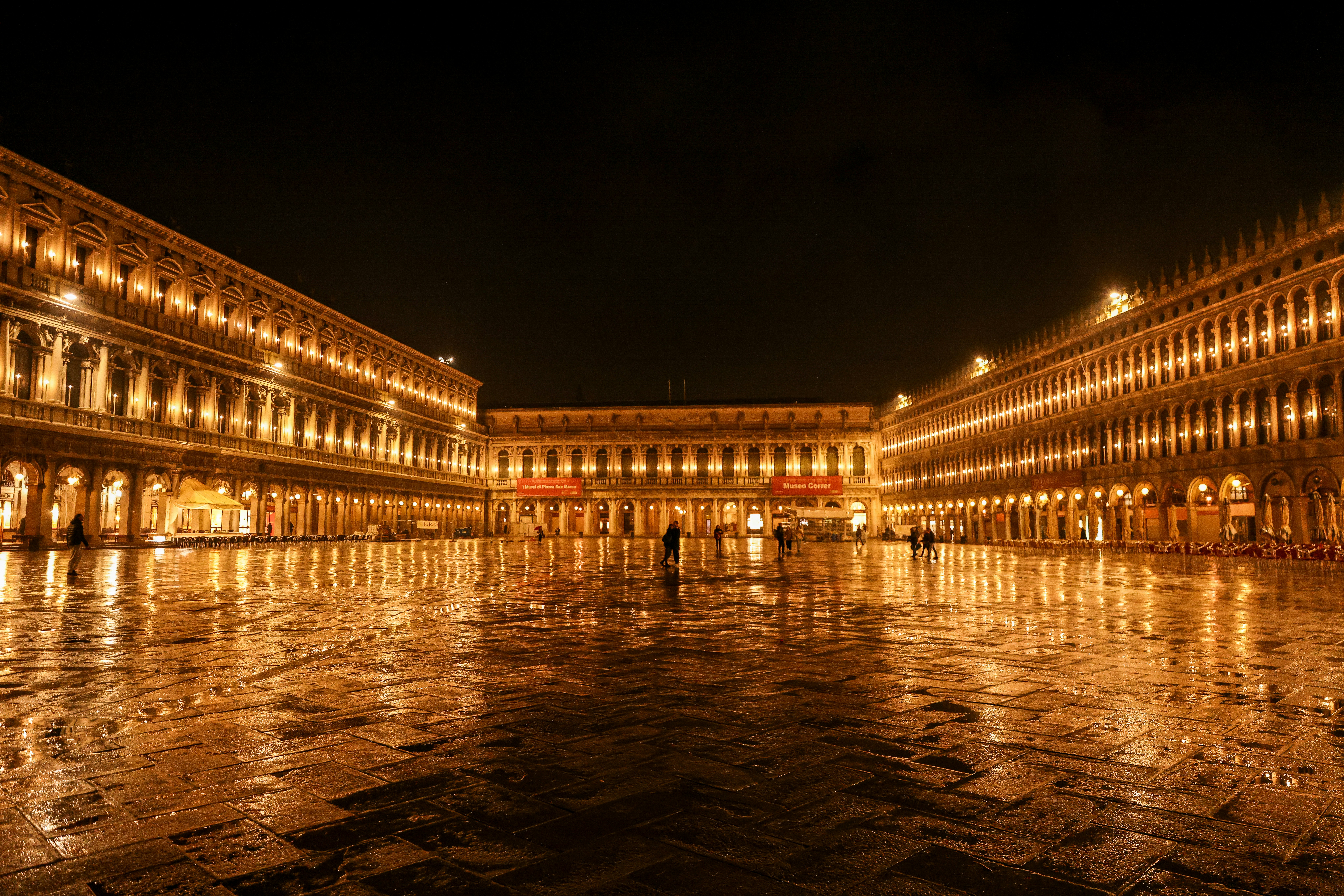 Golden Arcades: Night Reflection in the Piazza