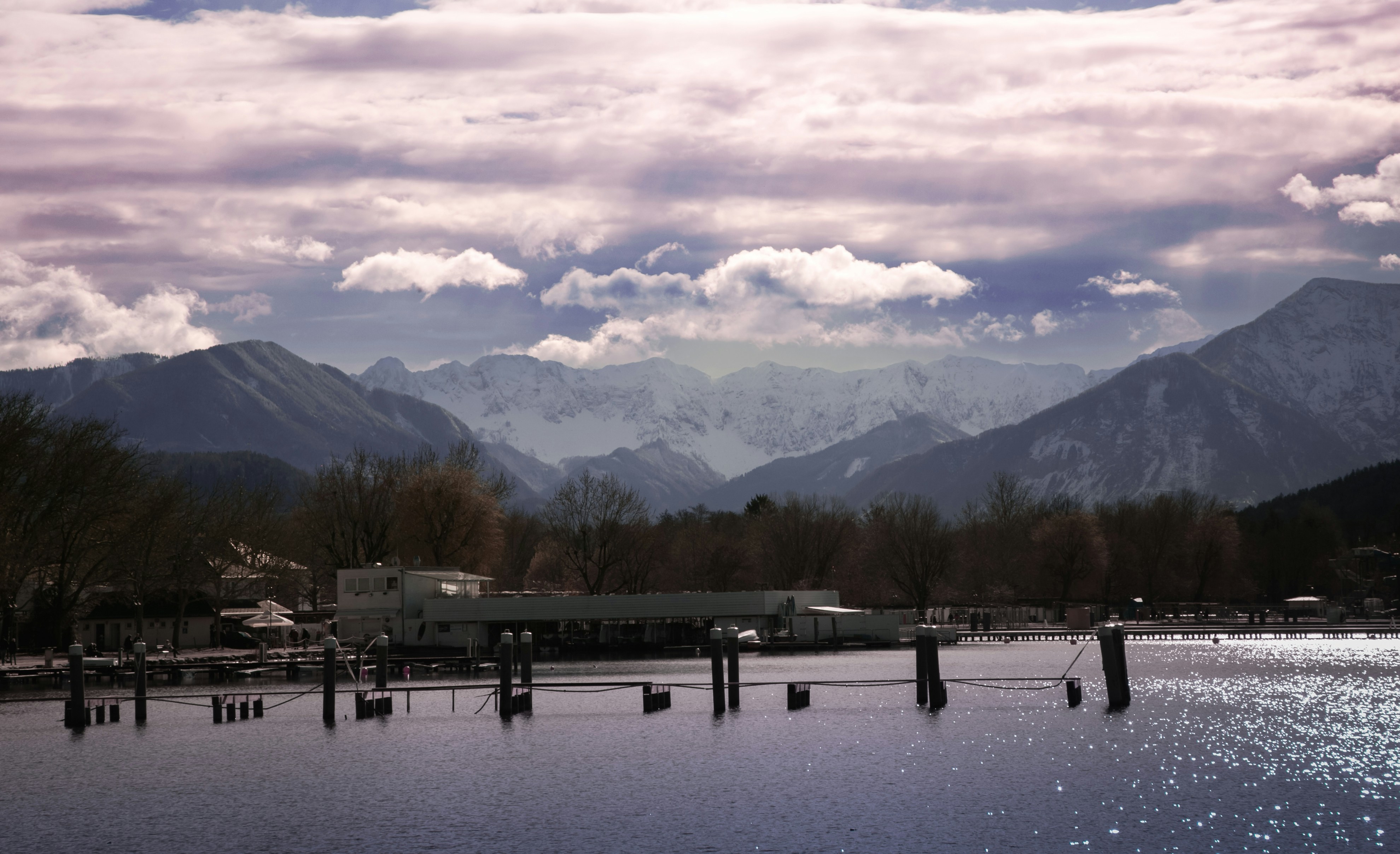 Snow-kissed Peaks Beyond a Quiet Waterfront