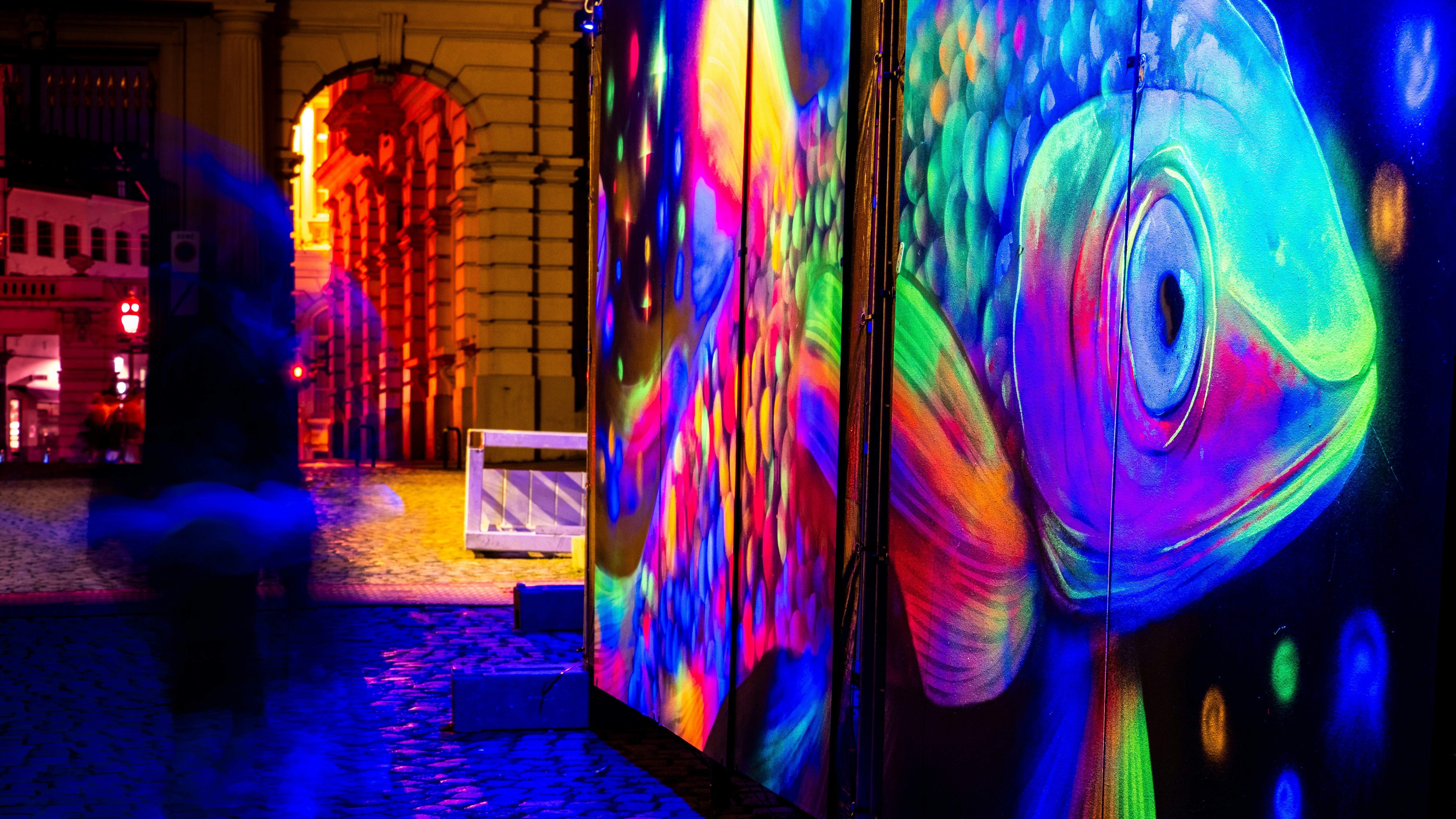 Neon Waves on a Cobblestone Night