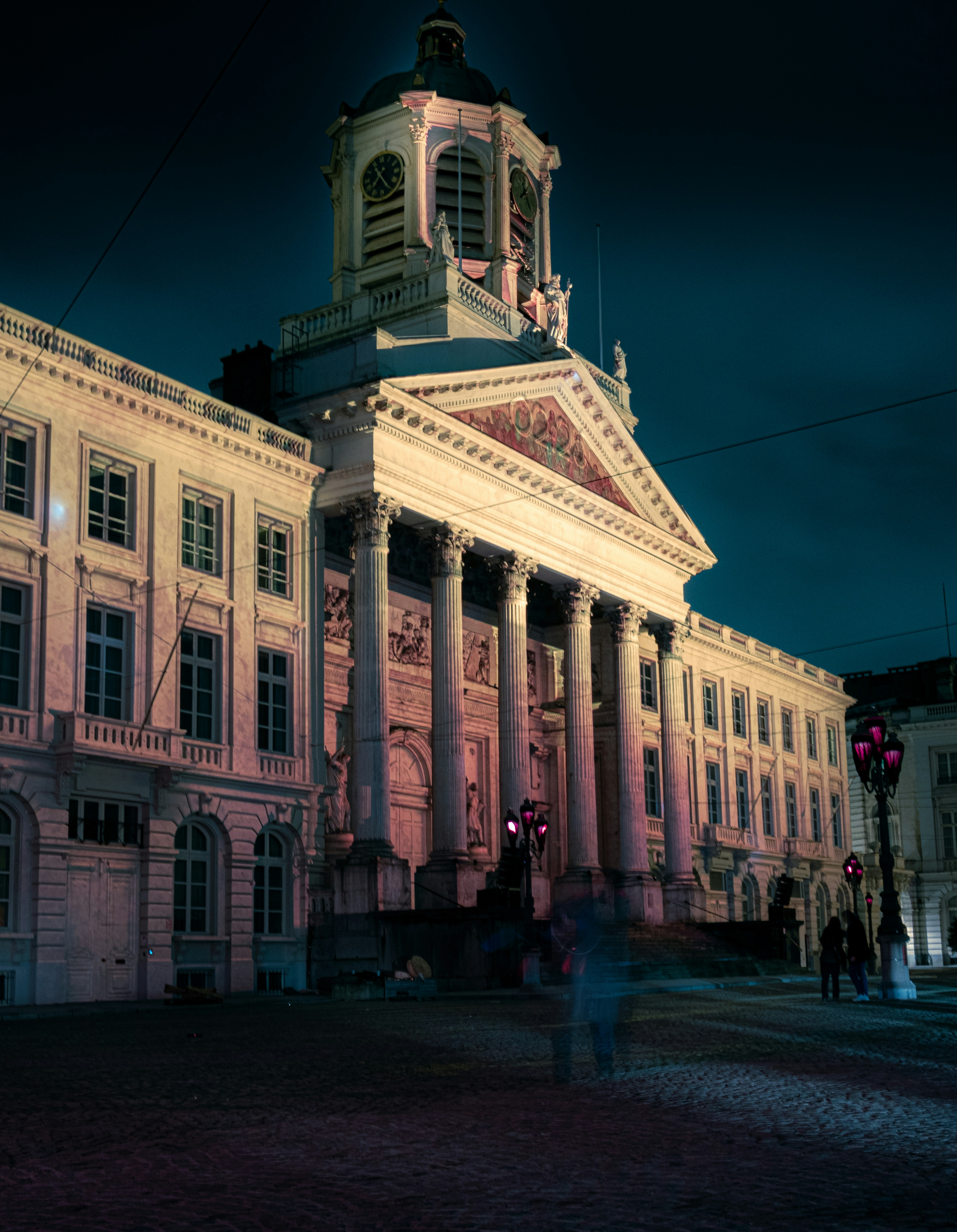 Neon-Tinted Facade: Midnight City Hall Under a Velvet Sky