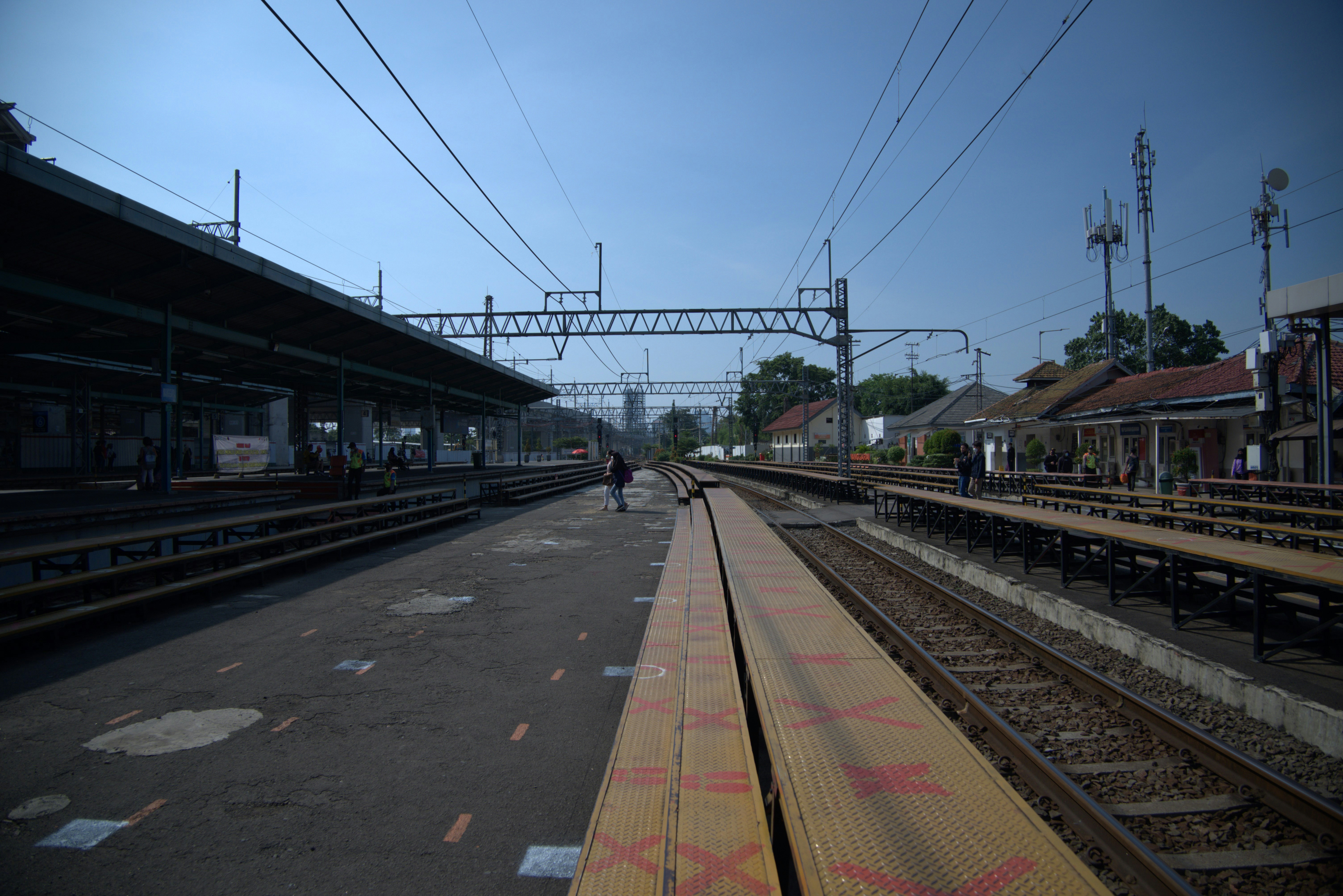 Morning at the Quiet Platform: Tracks Stretch into Tomorrow