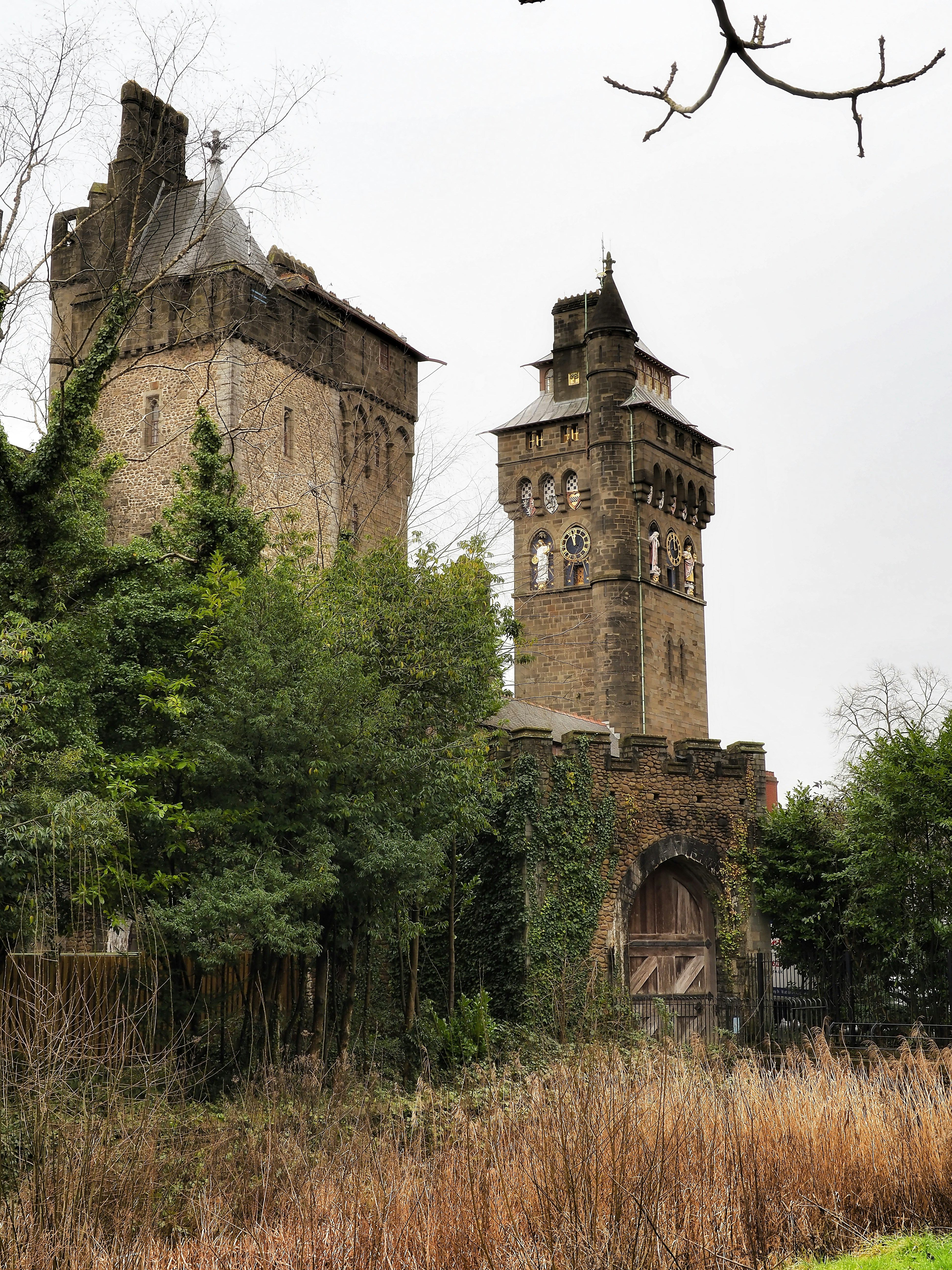Towering Gate and Overgrown Courtyard